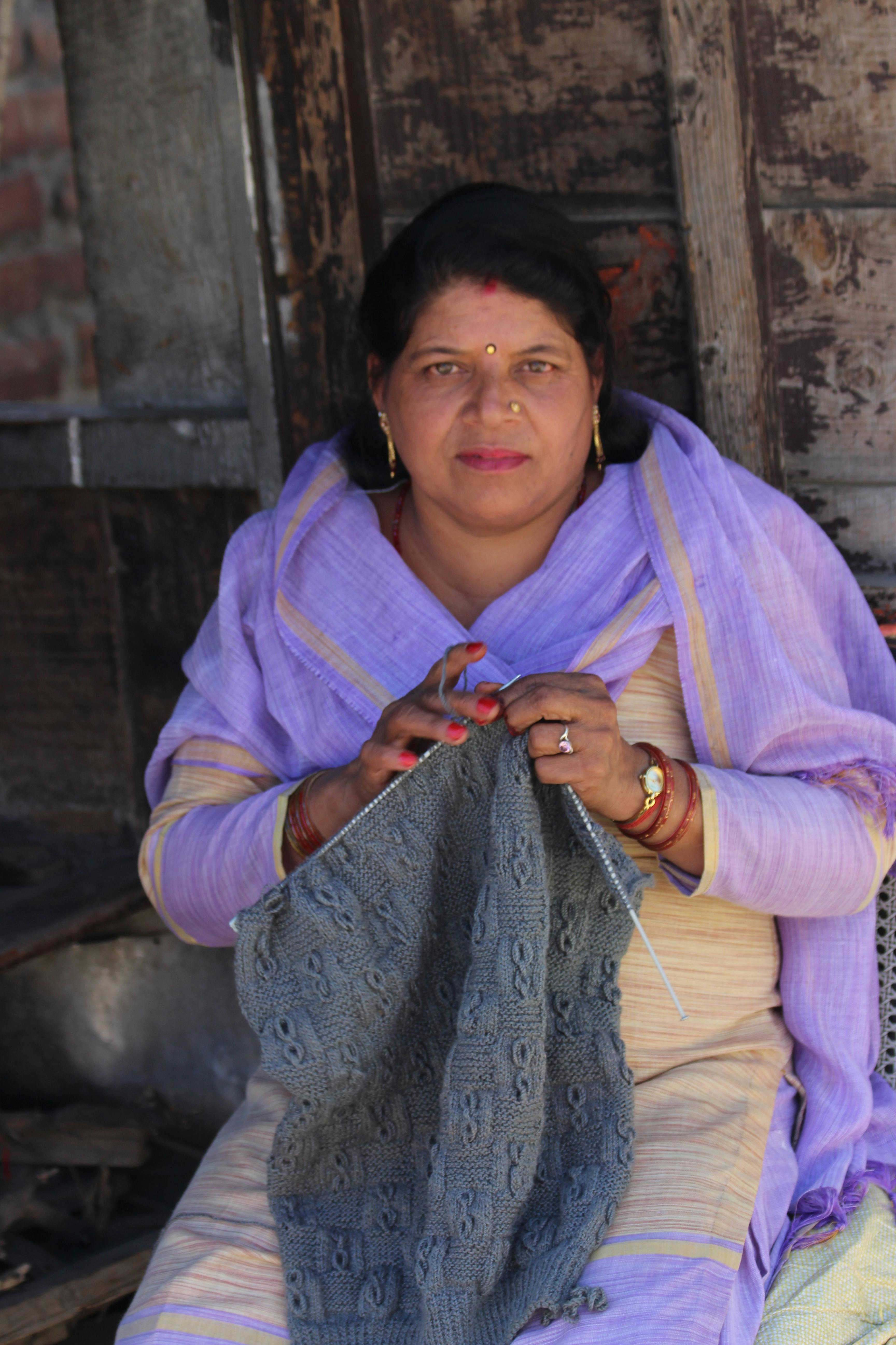 Indian Woman Knitting in Traditional Attire · Free Stock Photo