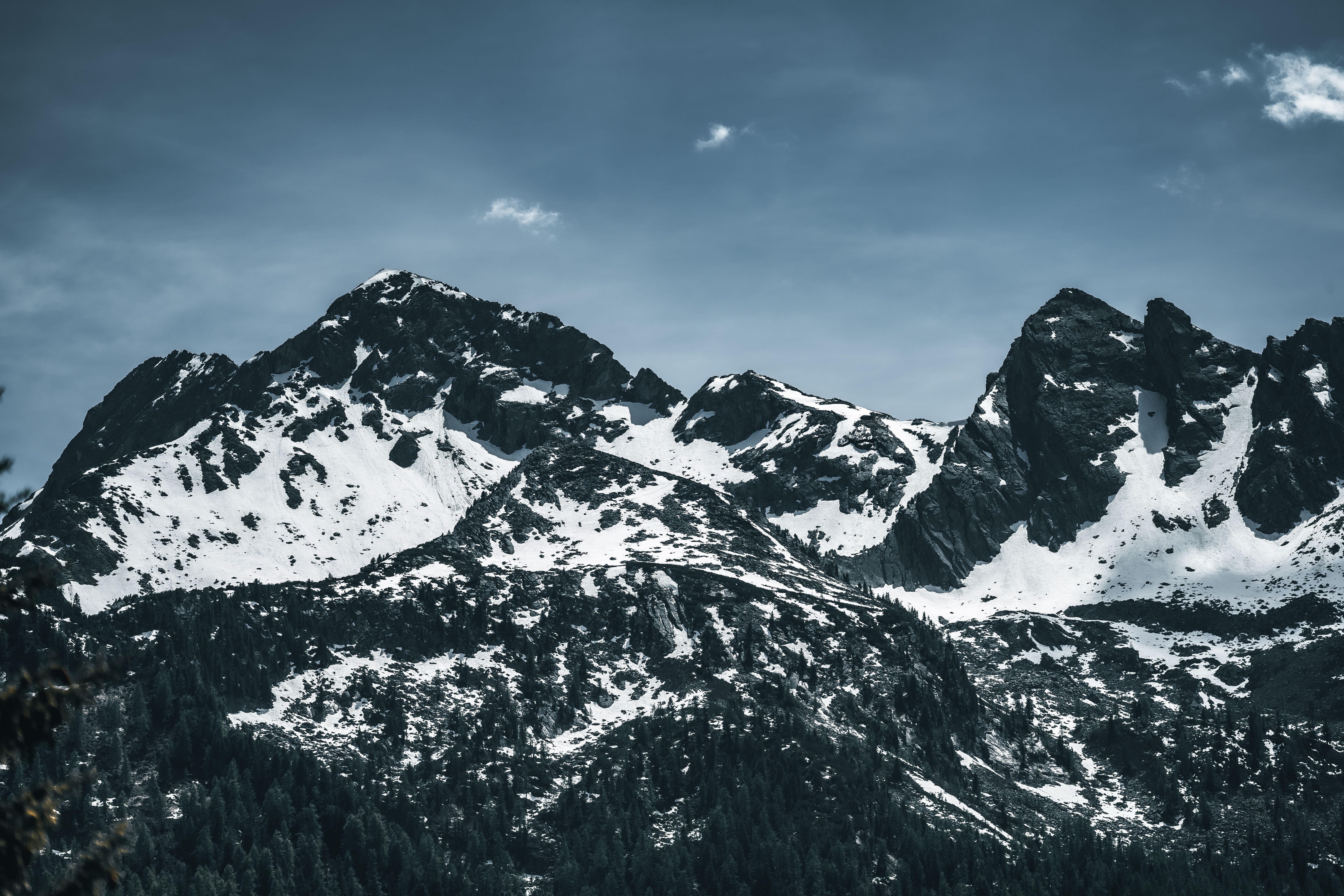 Snow-Capped Mountain Peaks Under Clear Sky · Free Stock Photo