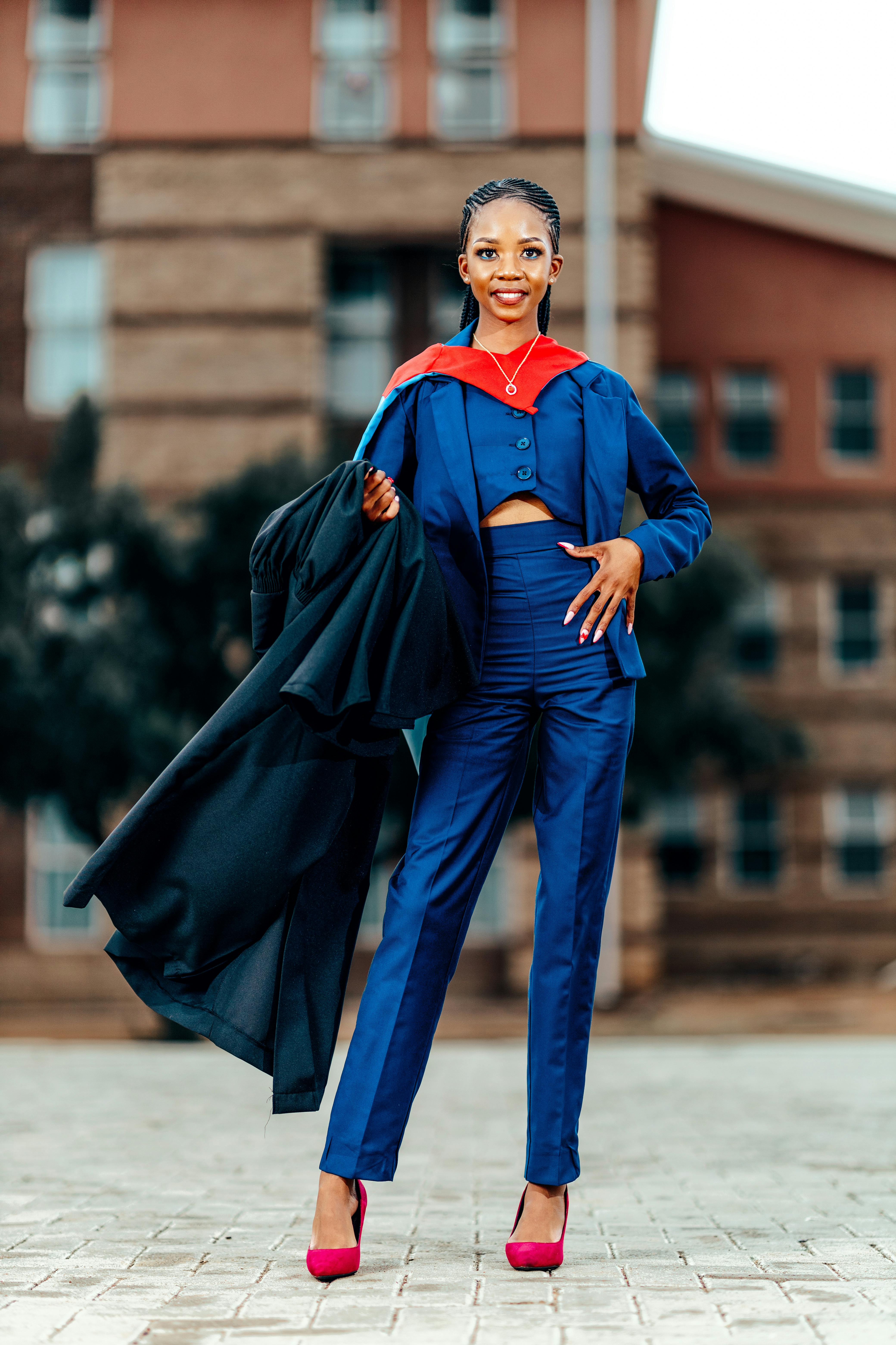 Confident Graduate in Formal Attire Outdoors · Free Stock Photo
