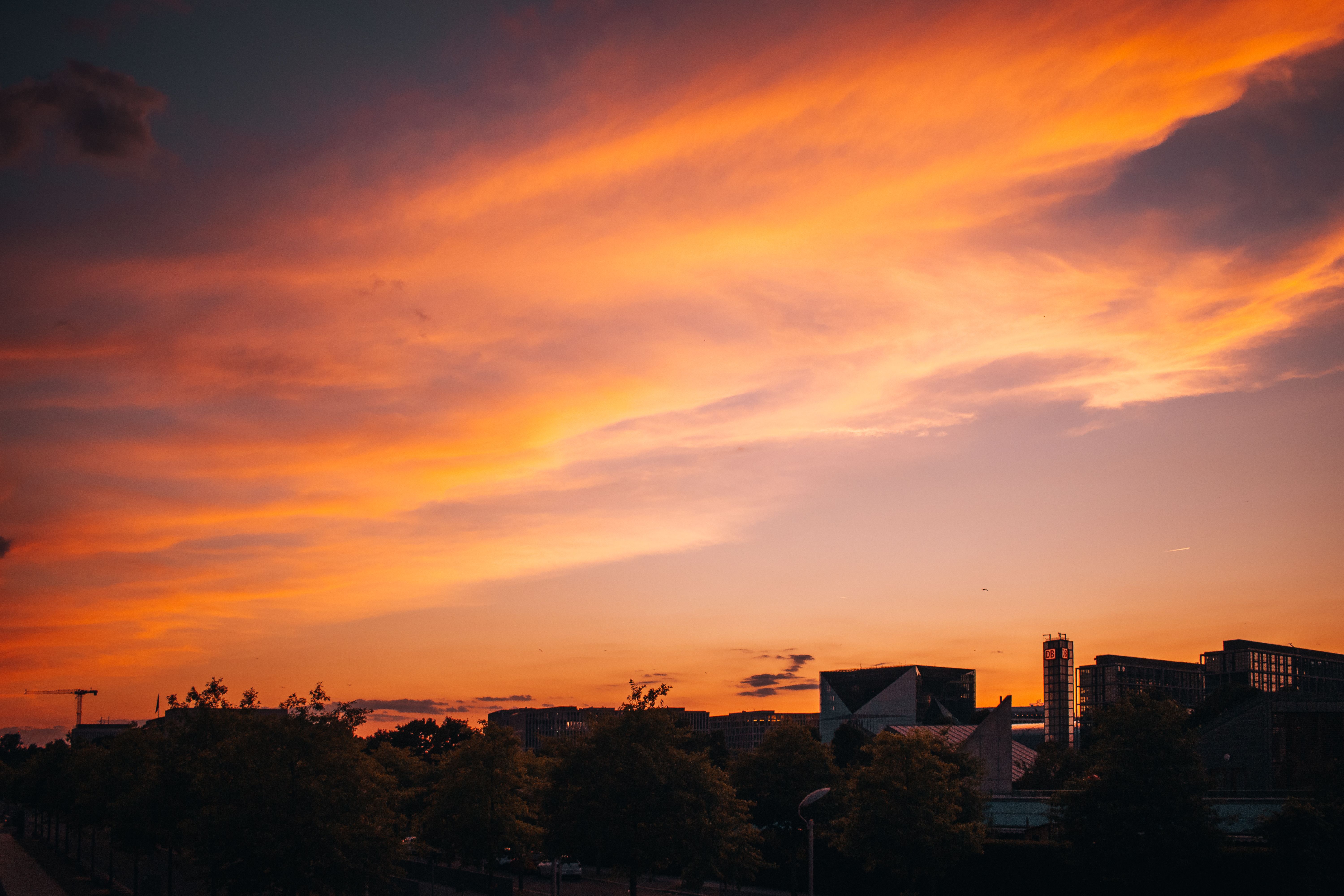 Vibrant Orange Sunset over Berlin Skyline · Free Stock Photo