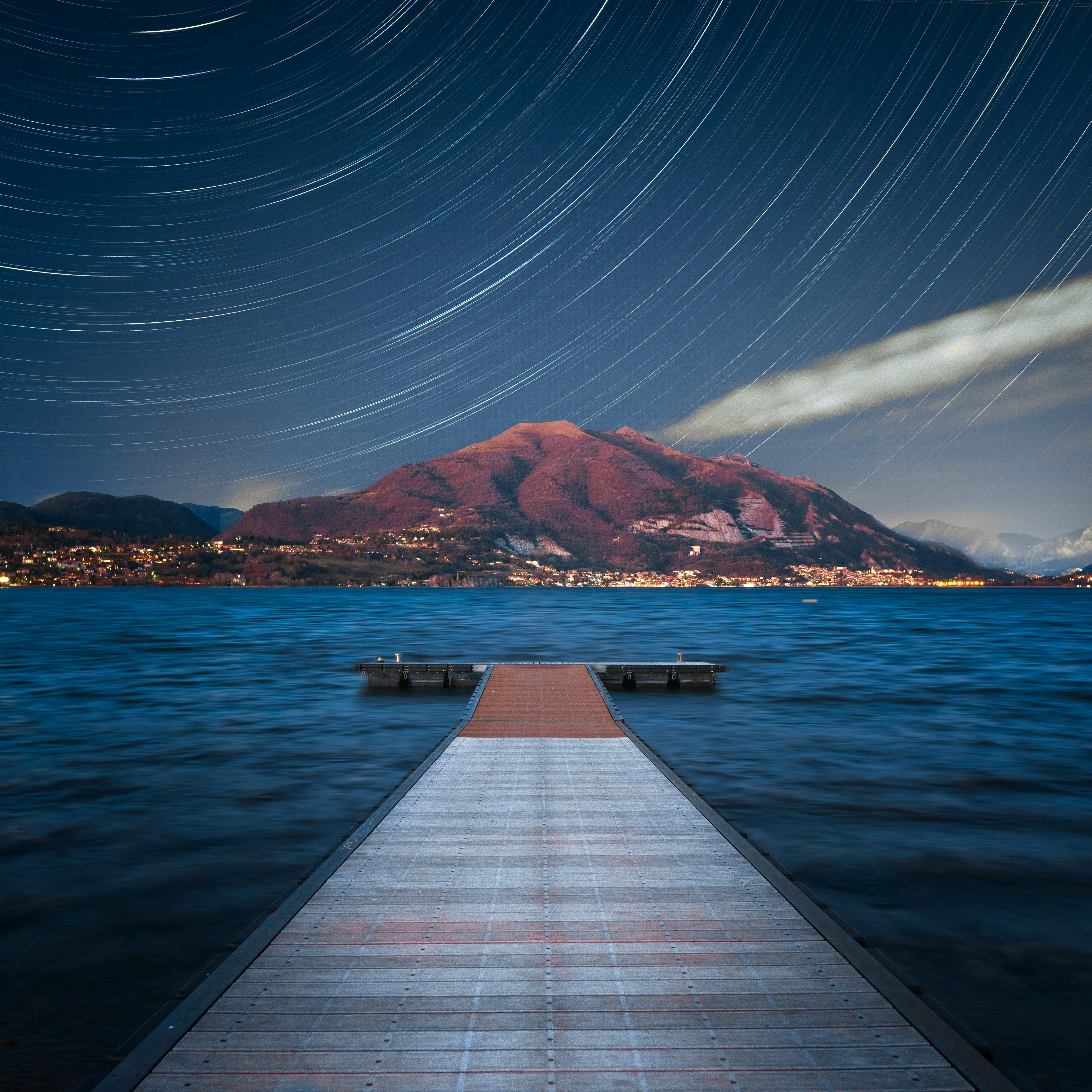 Stunning Starry Night Over Lake in Lombardia, Italy · Free Stock Photo
