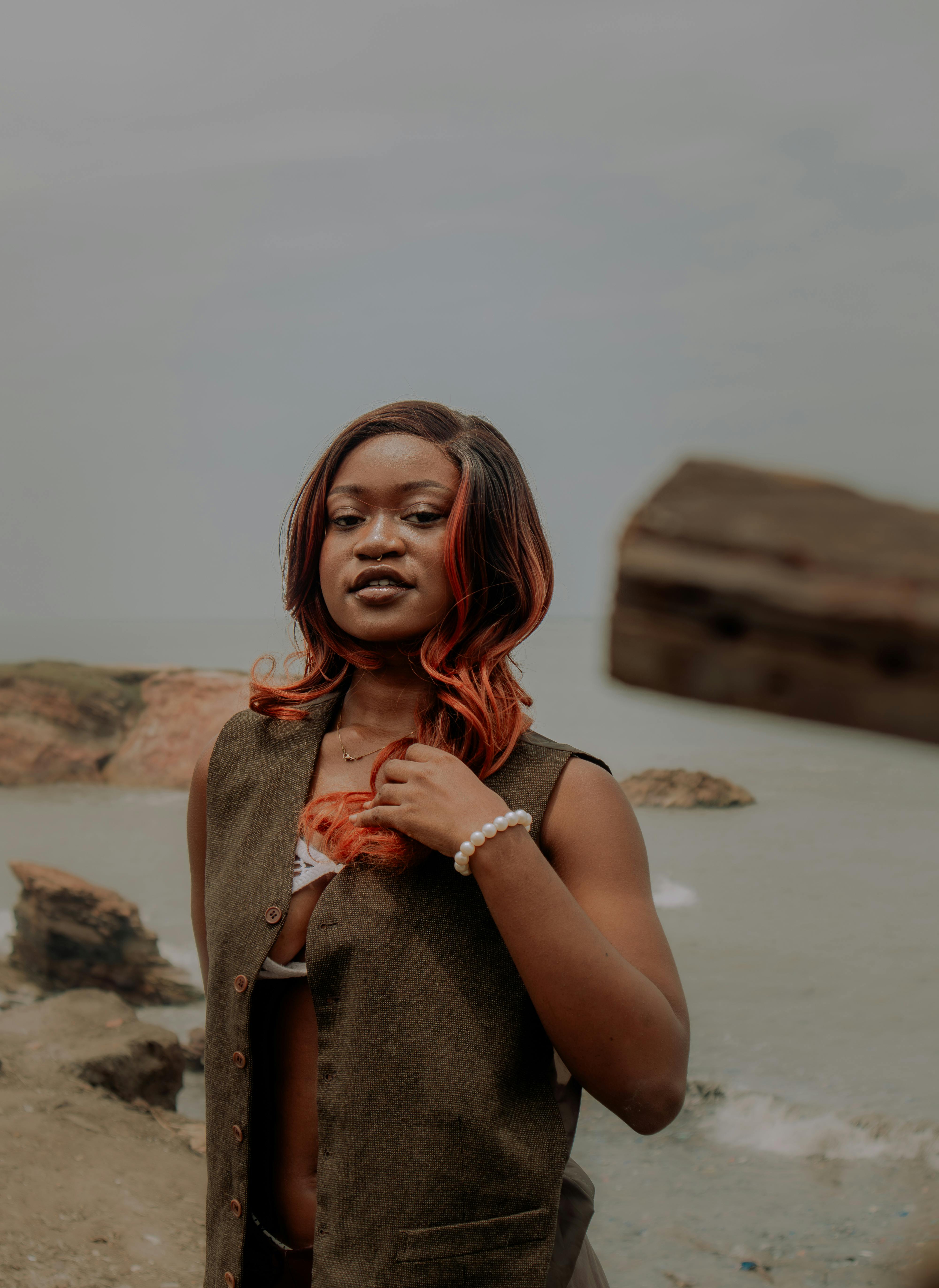 Stylish African Woman in Coastal Portrait · Free Stock Photo