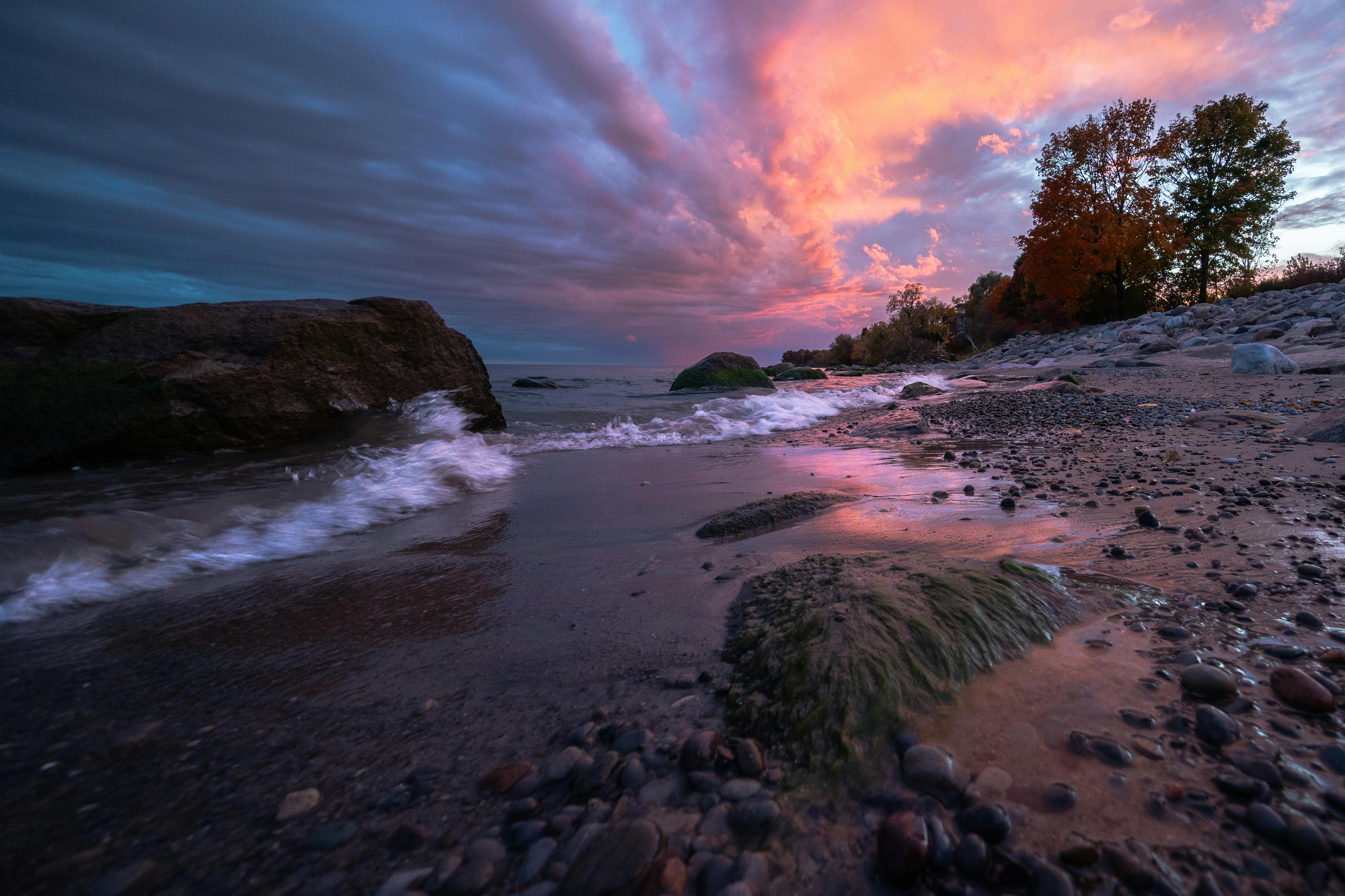 Stunning Autumn Beach Sunset with Waves · Free Stock Photo
