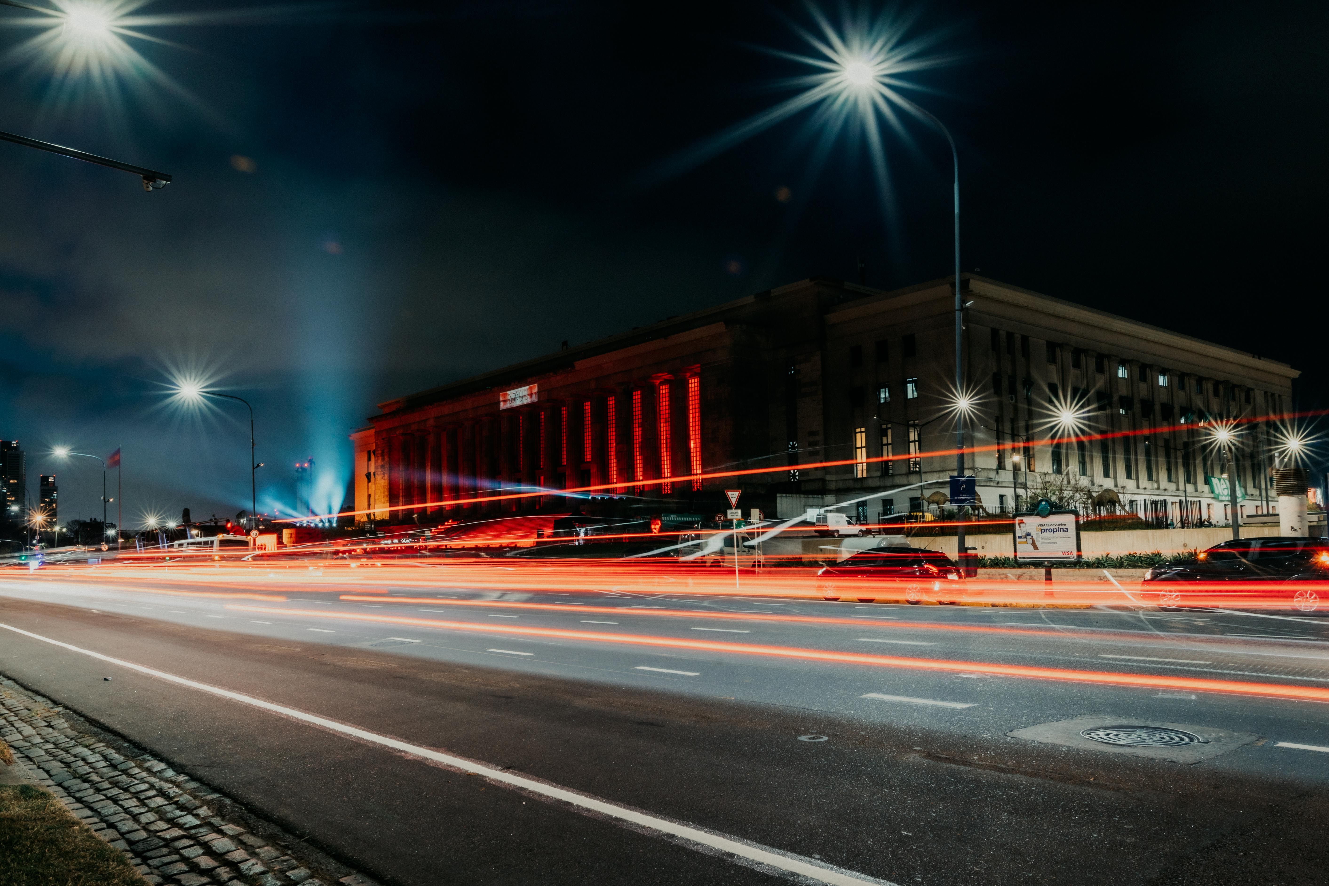 Vibrant Night Street Scene with Light Trails · Free Stock Photo