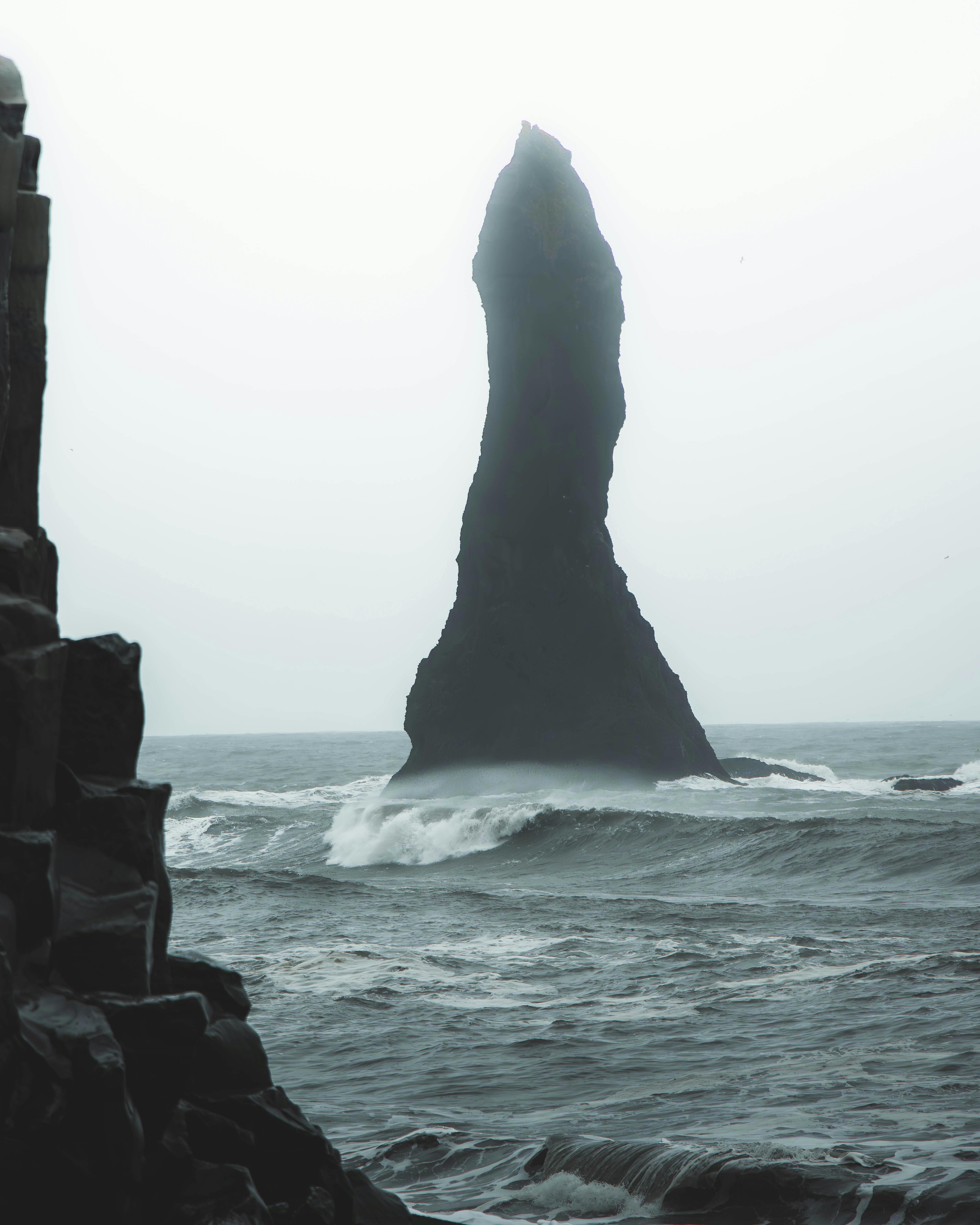 Dramatic Seascape with Iconic Sea Stack · Free Stock Photo