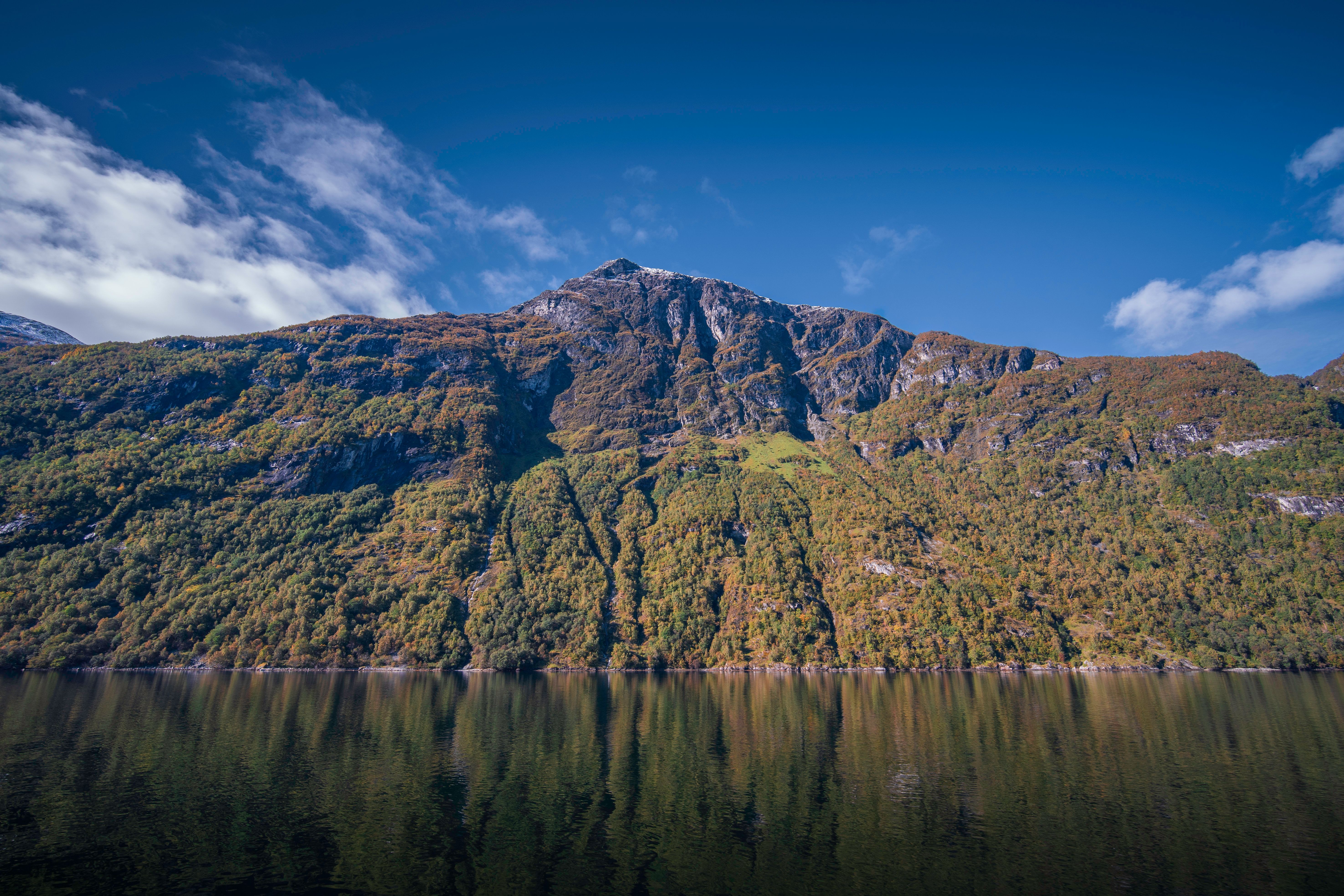 Scenic Norwegian Fjord Landscape with Blue Sky · Free Stock Photo