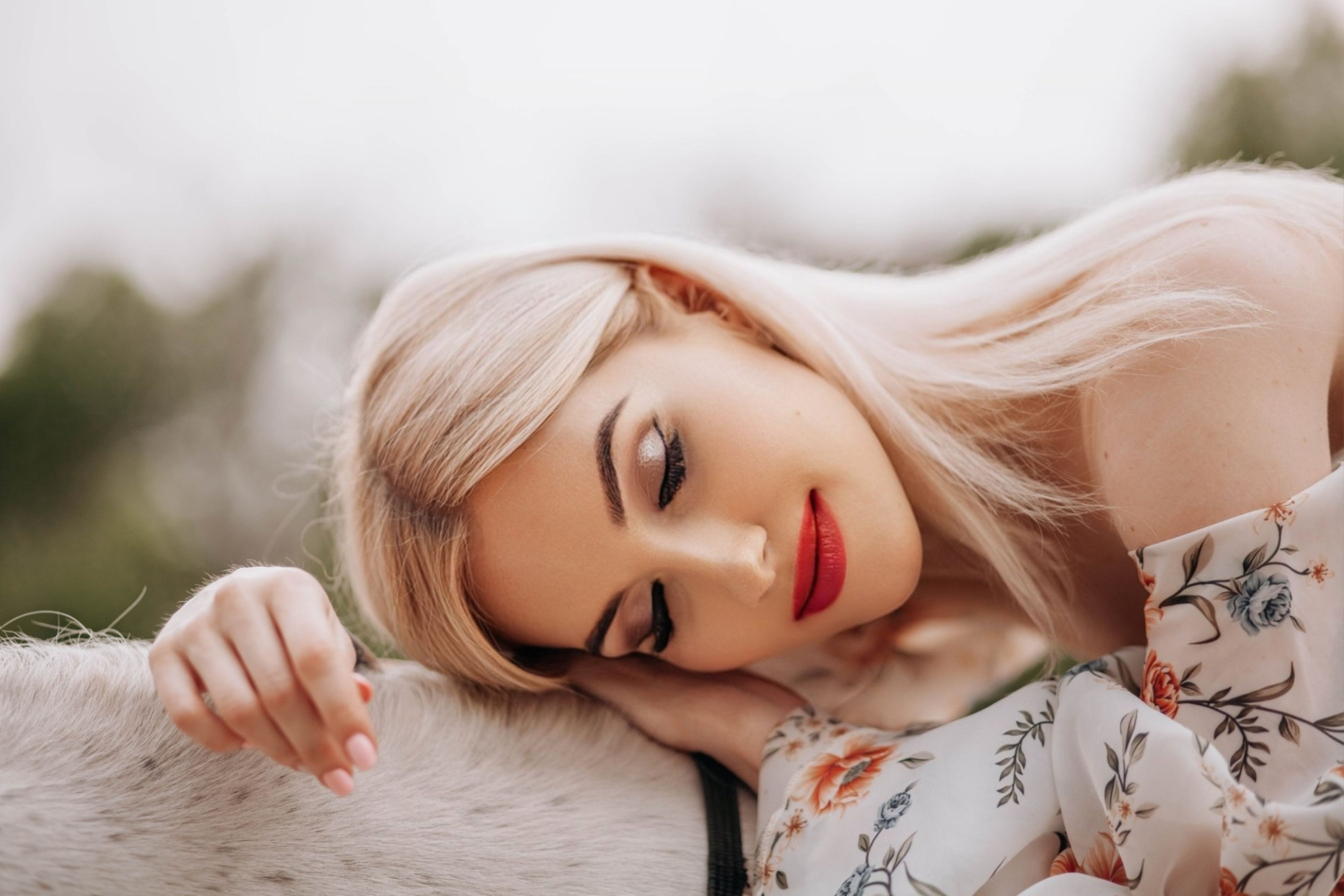 Woman resting peacefully on grassy field · Free Stock Photo