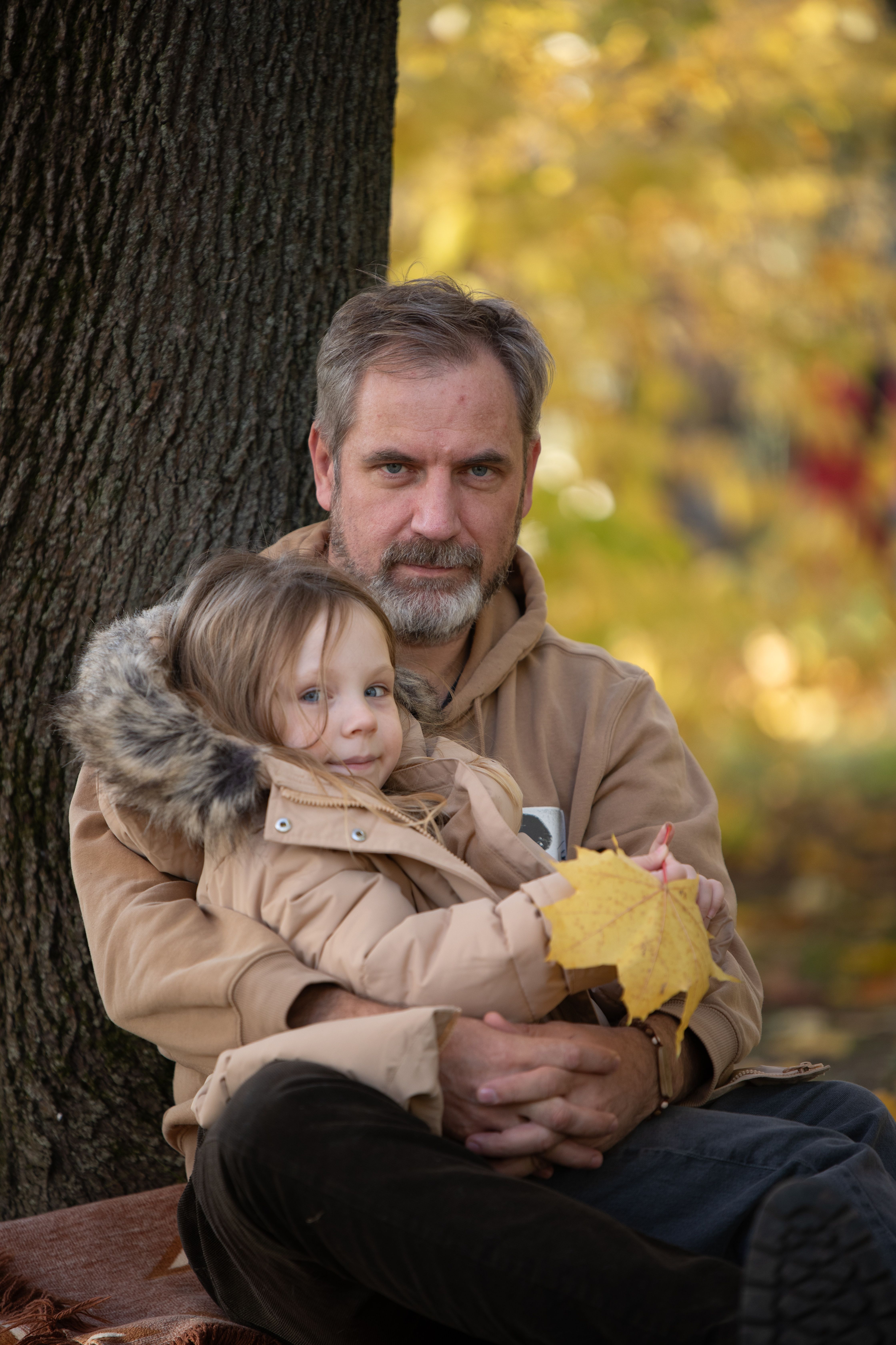 Father and Daughter Enjoy Autumn Outdoors · Free Stock Photo