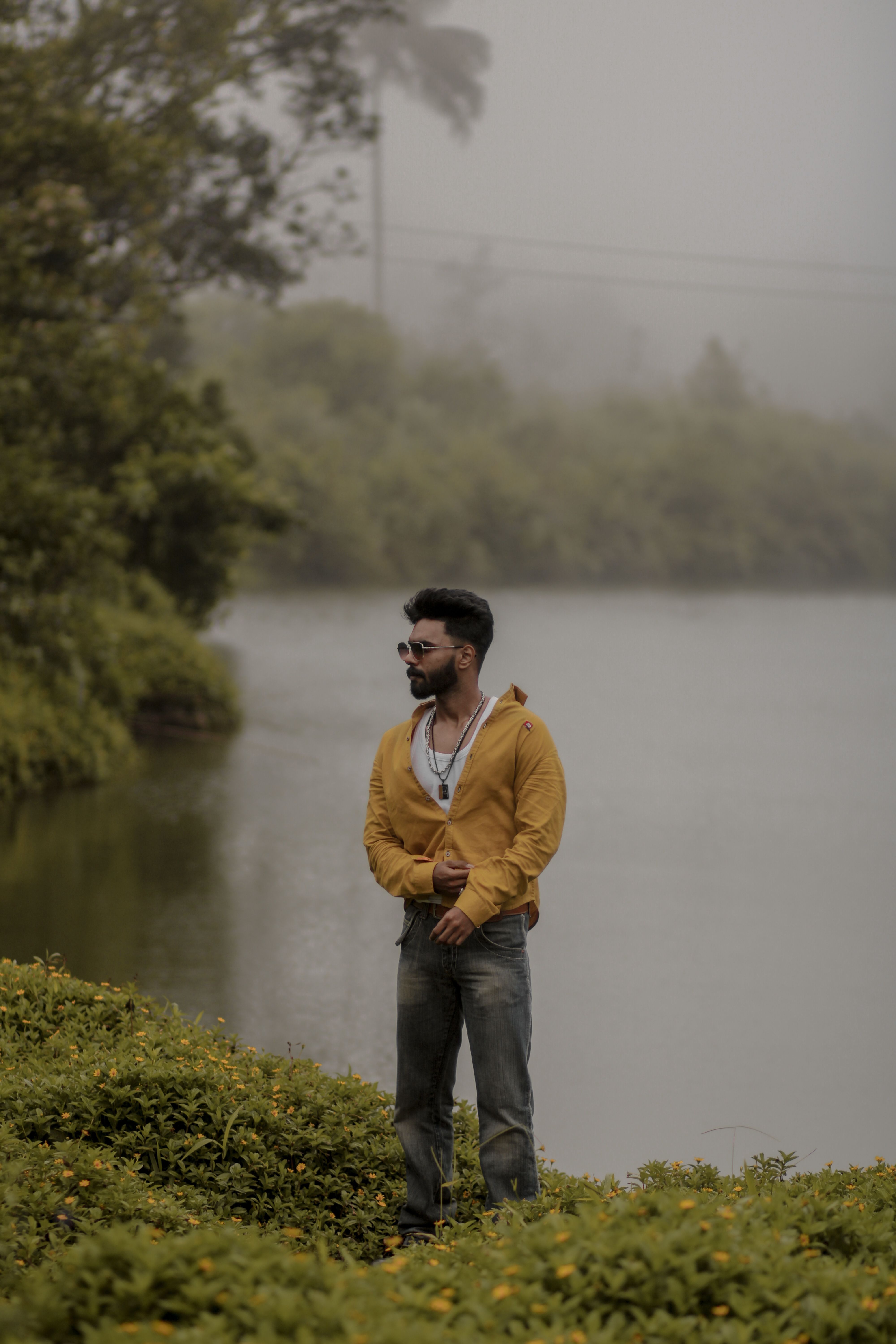 Portrait of a Man by a Misty Lake in Vagamon · Free Stock Photo