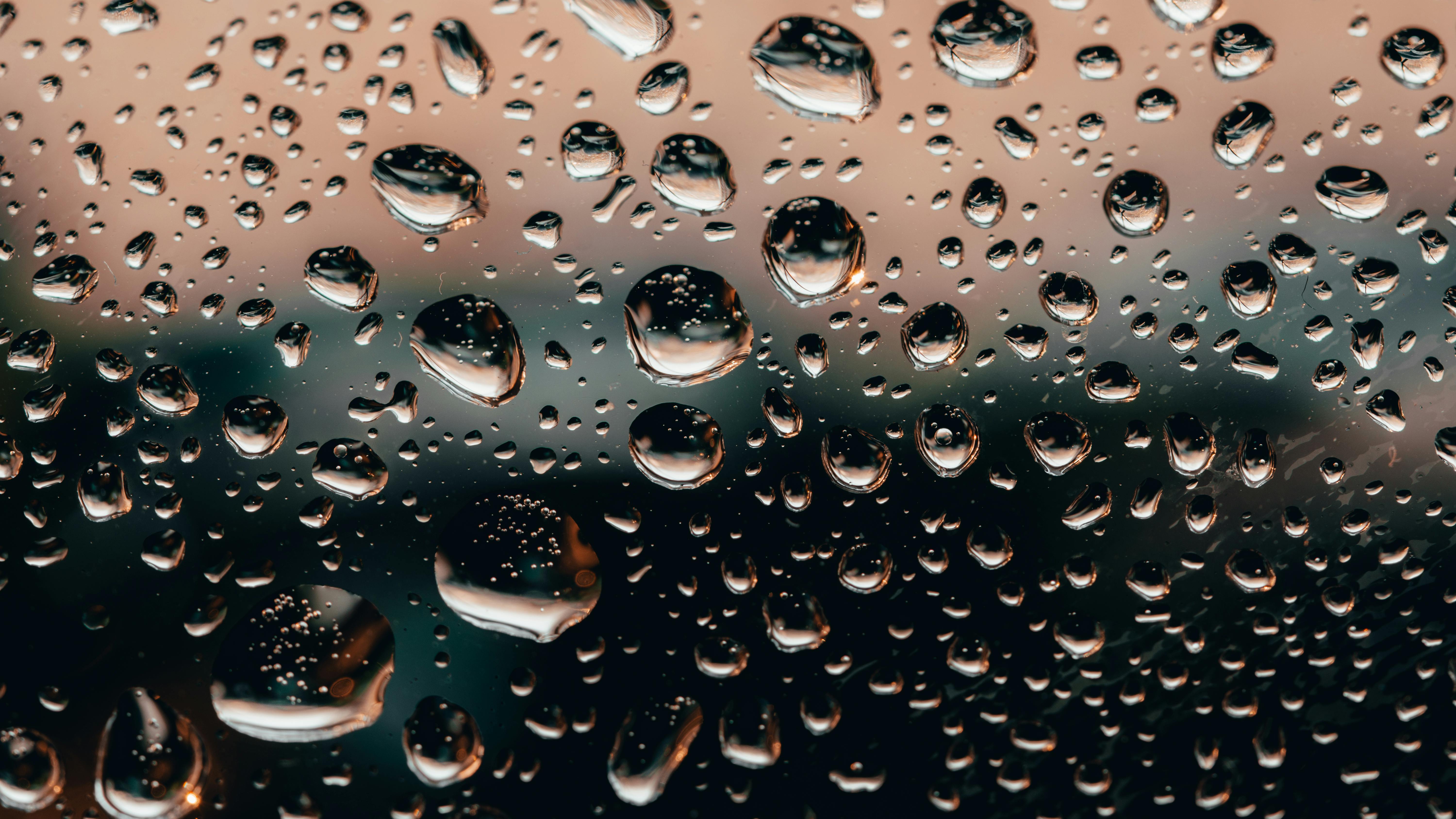 Photo Of Water Droplets On Glass Window · Free Stock Photo