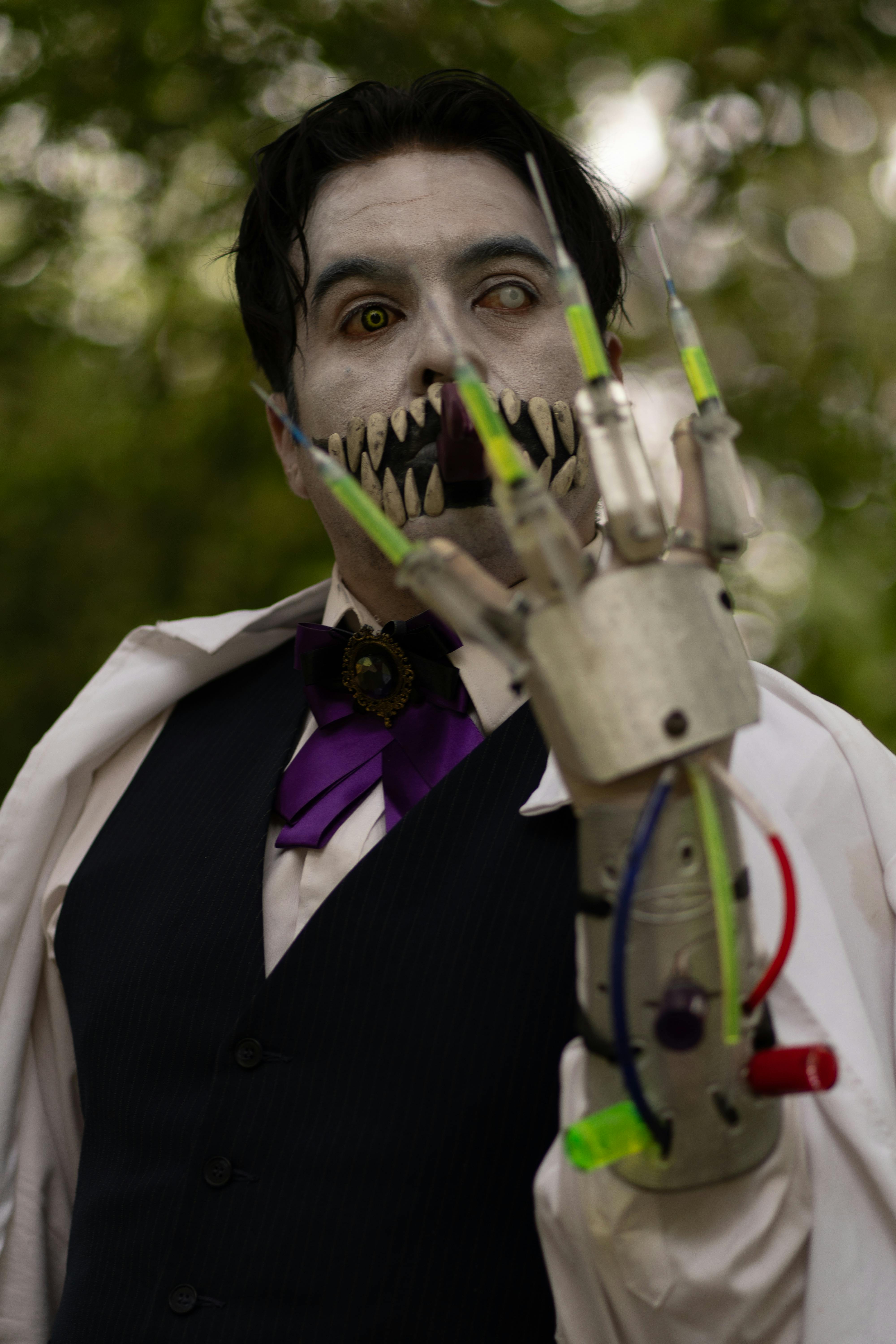 Terrifying Cosplay Character with Robotic Hand · Free Stock Photo
