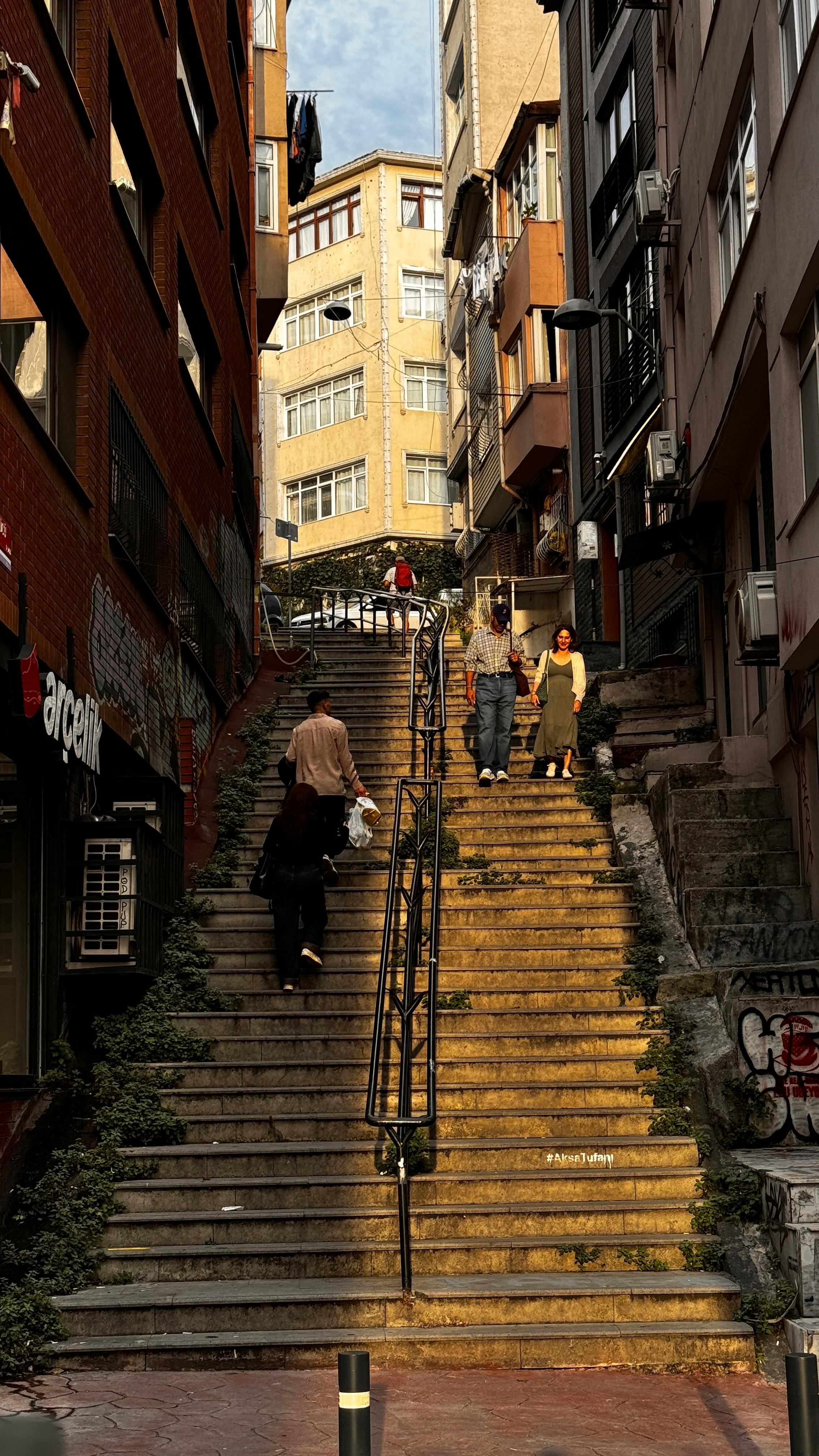 Bustling Urban Staircase Scene in Daylight · Free Stock Photo