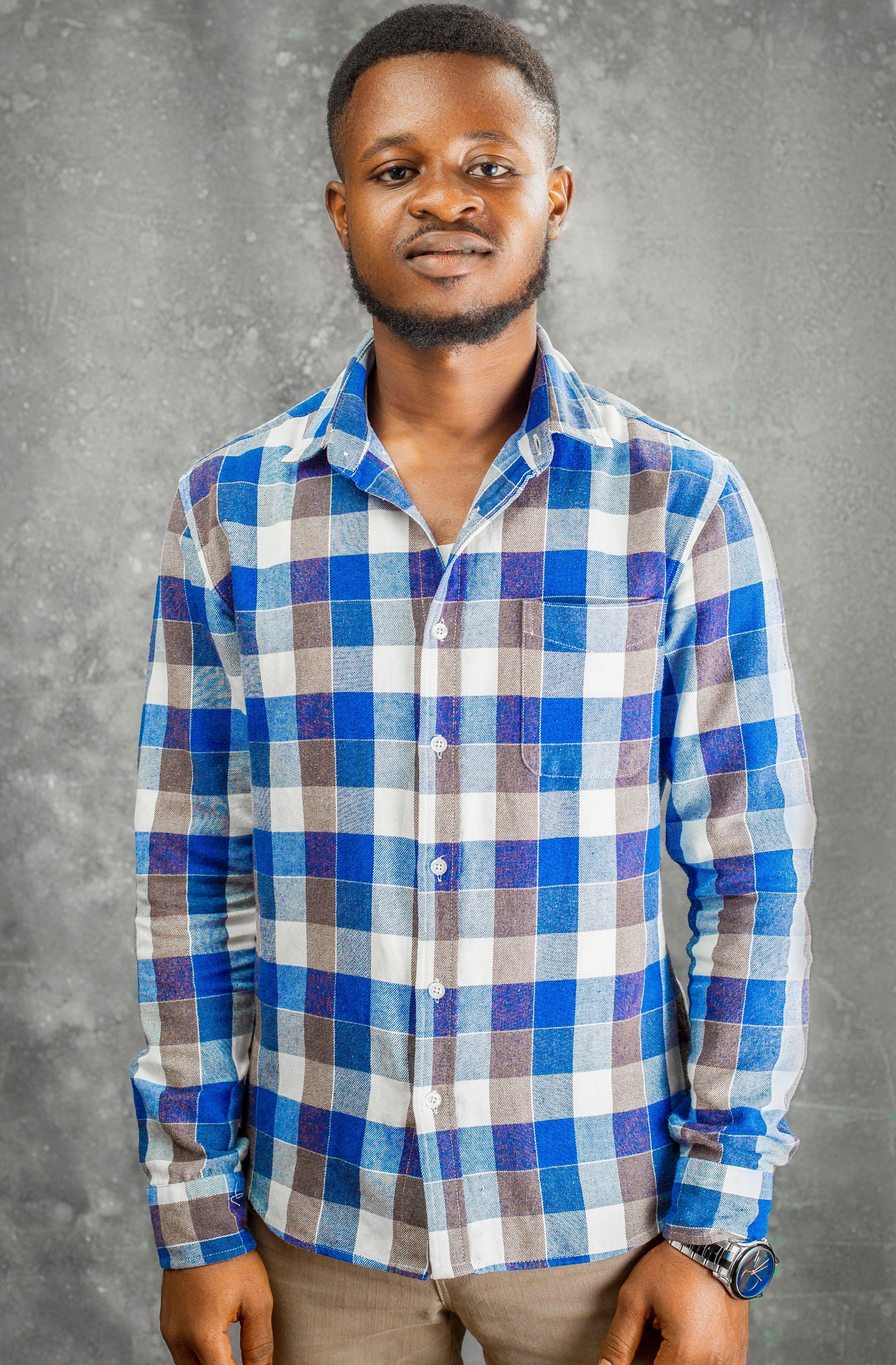 Portrait of a Man in a Checked Shirt · Free Stock Photo