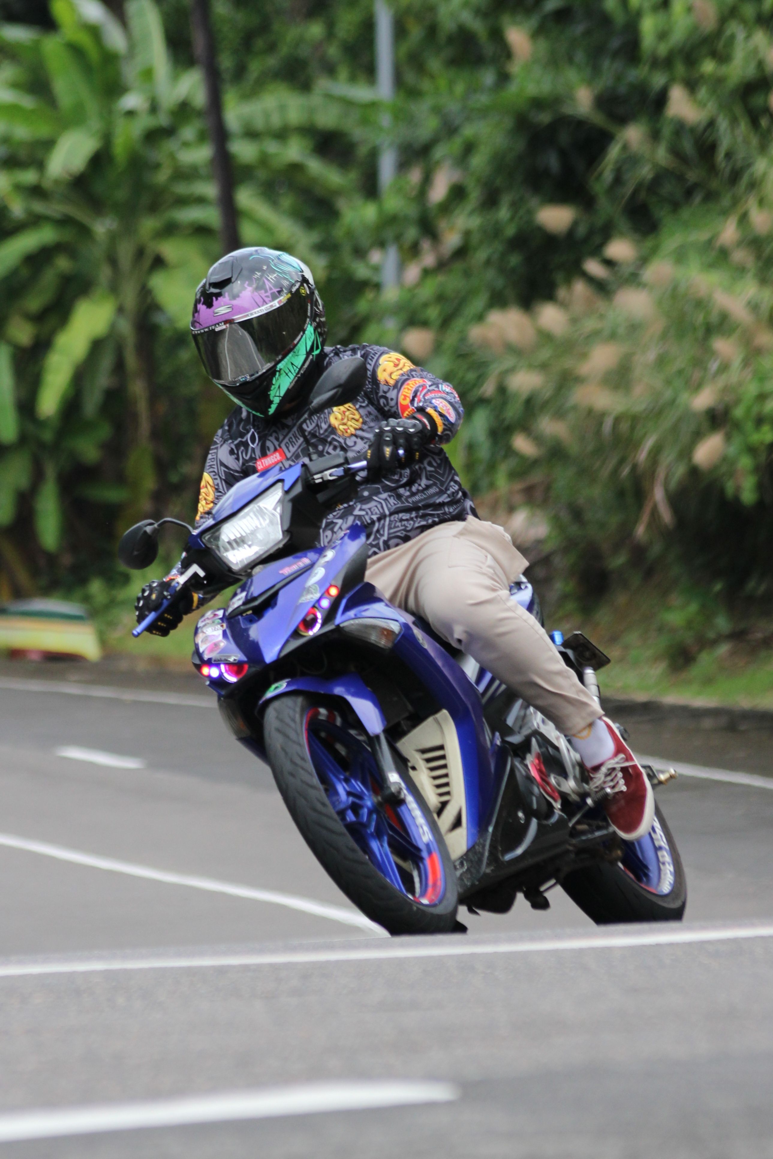 Exciting Motorcycle Rider on Curvy Road · Free Stock Photo