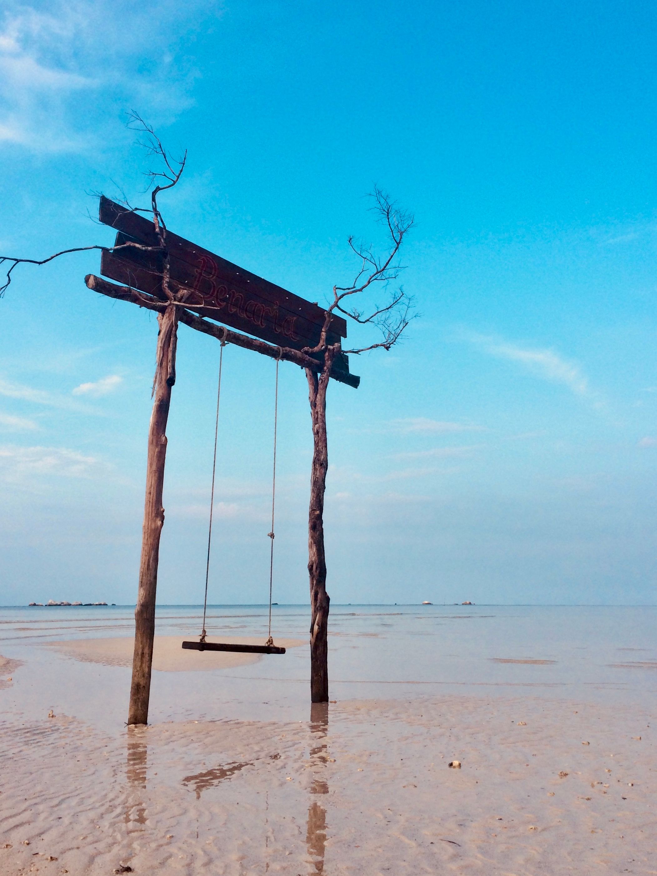 Idyllic Beach Swing Under Clear Blue Skies · Free Stock Photo
