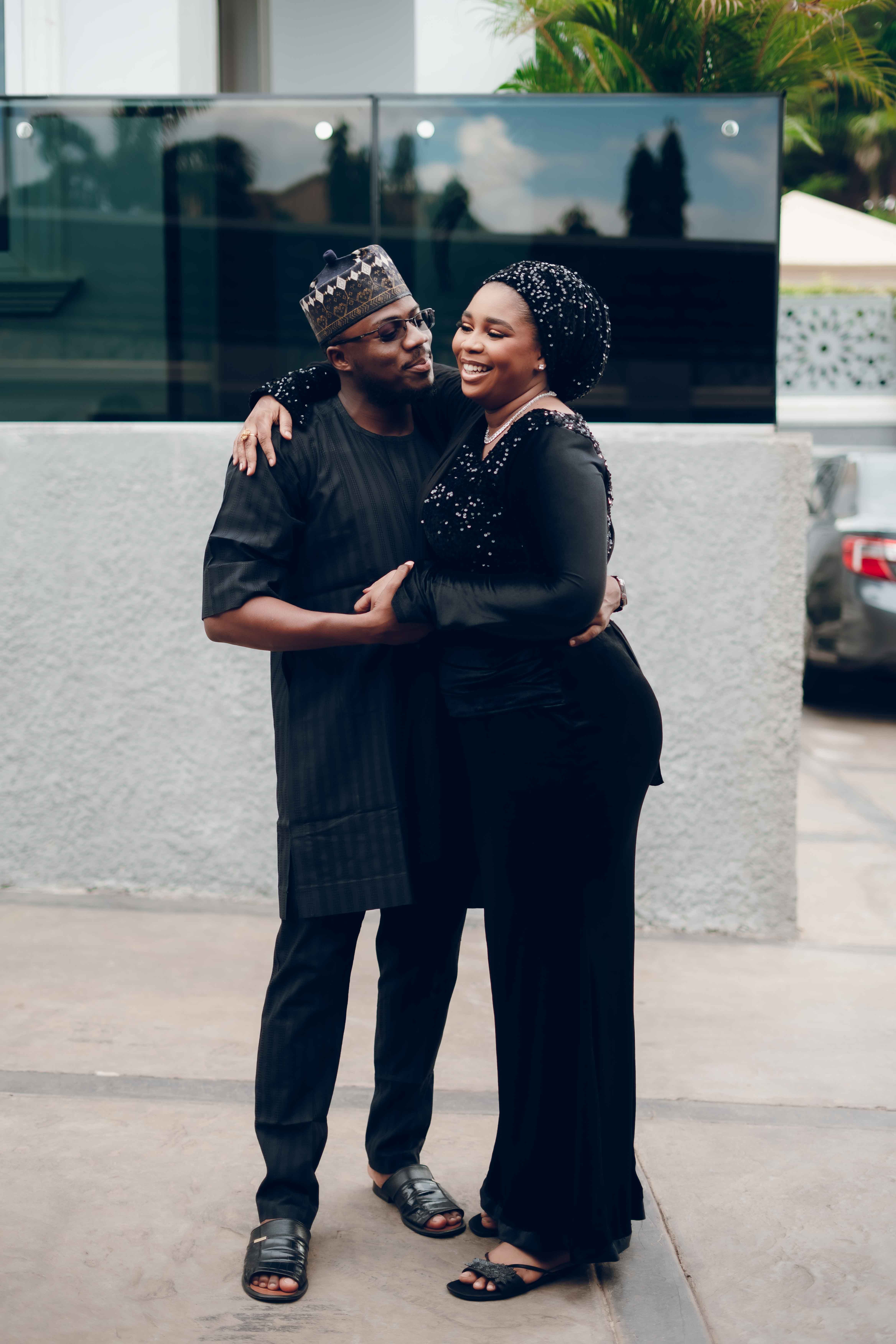 African Couple Embracing in Traditional Attire · Free Stock Photo