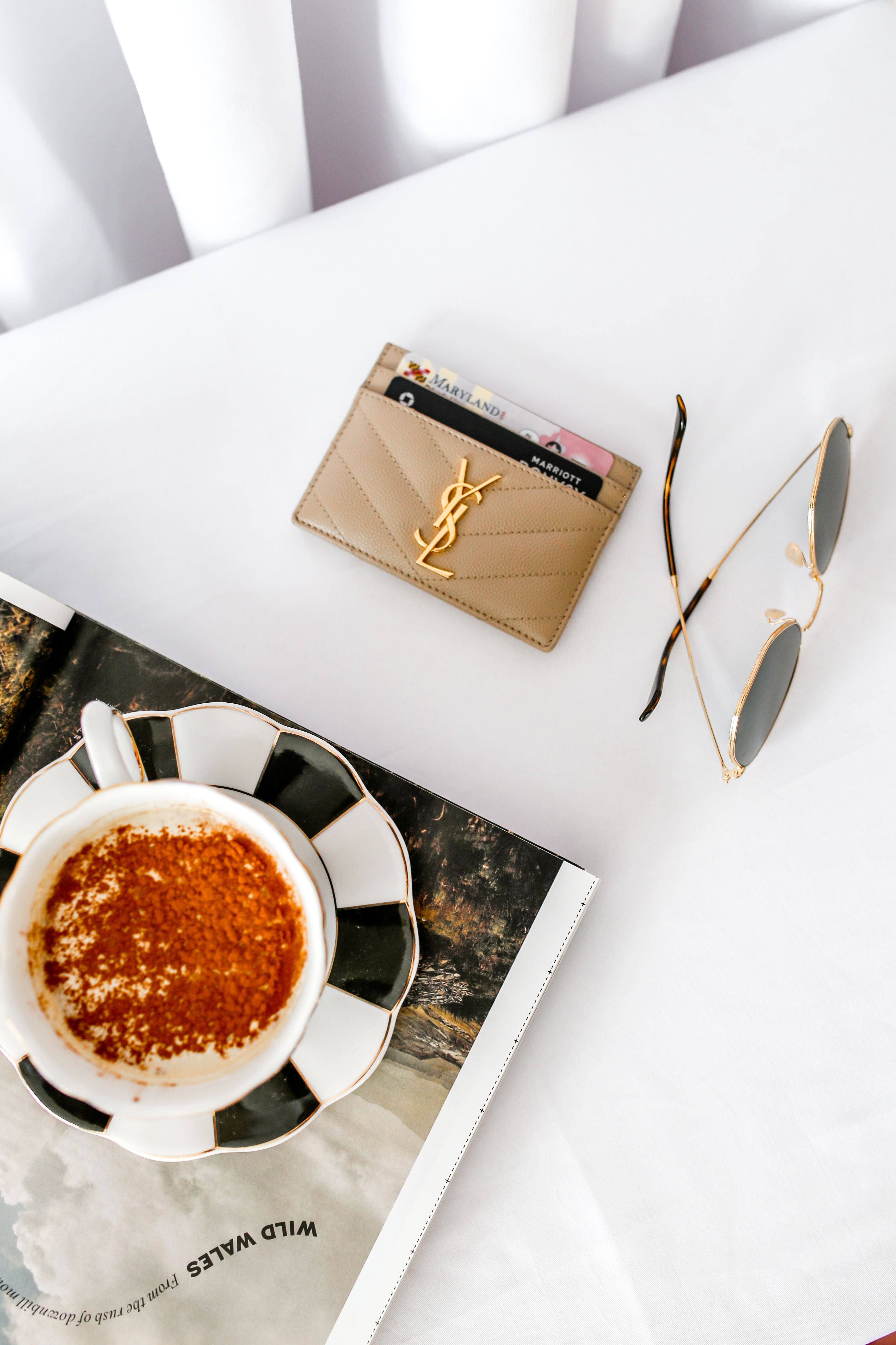 Elegant Coffee Table Setting with Wallet and Sunglasses · Free Stock Photo