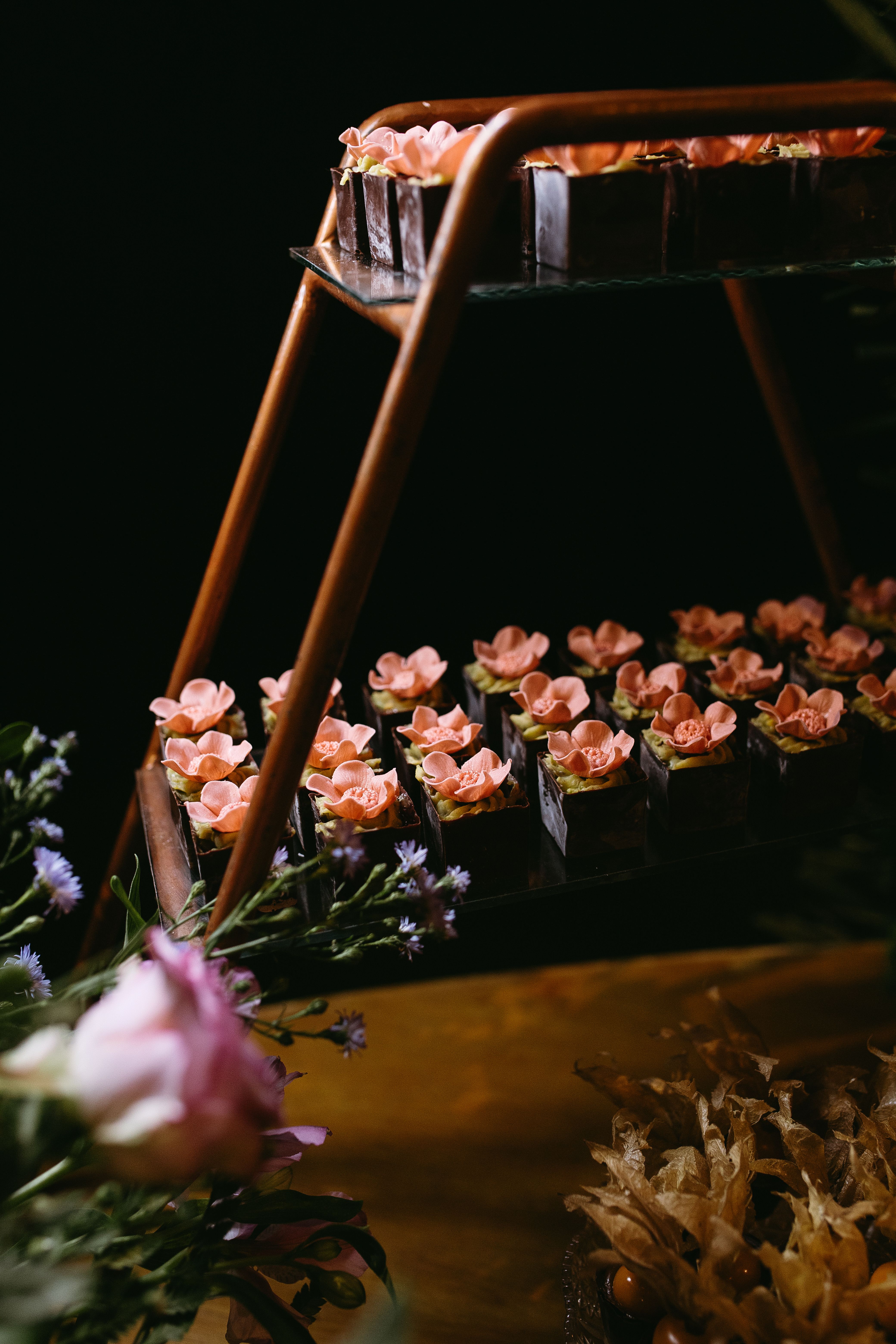 Elegant Floral Dessert Display on Tiered Stand · Free Stock Photo