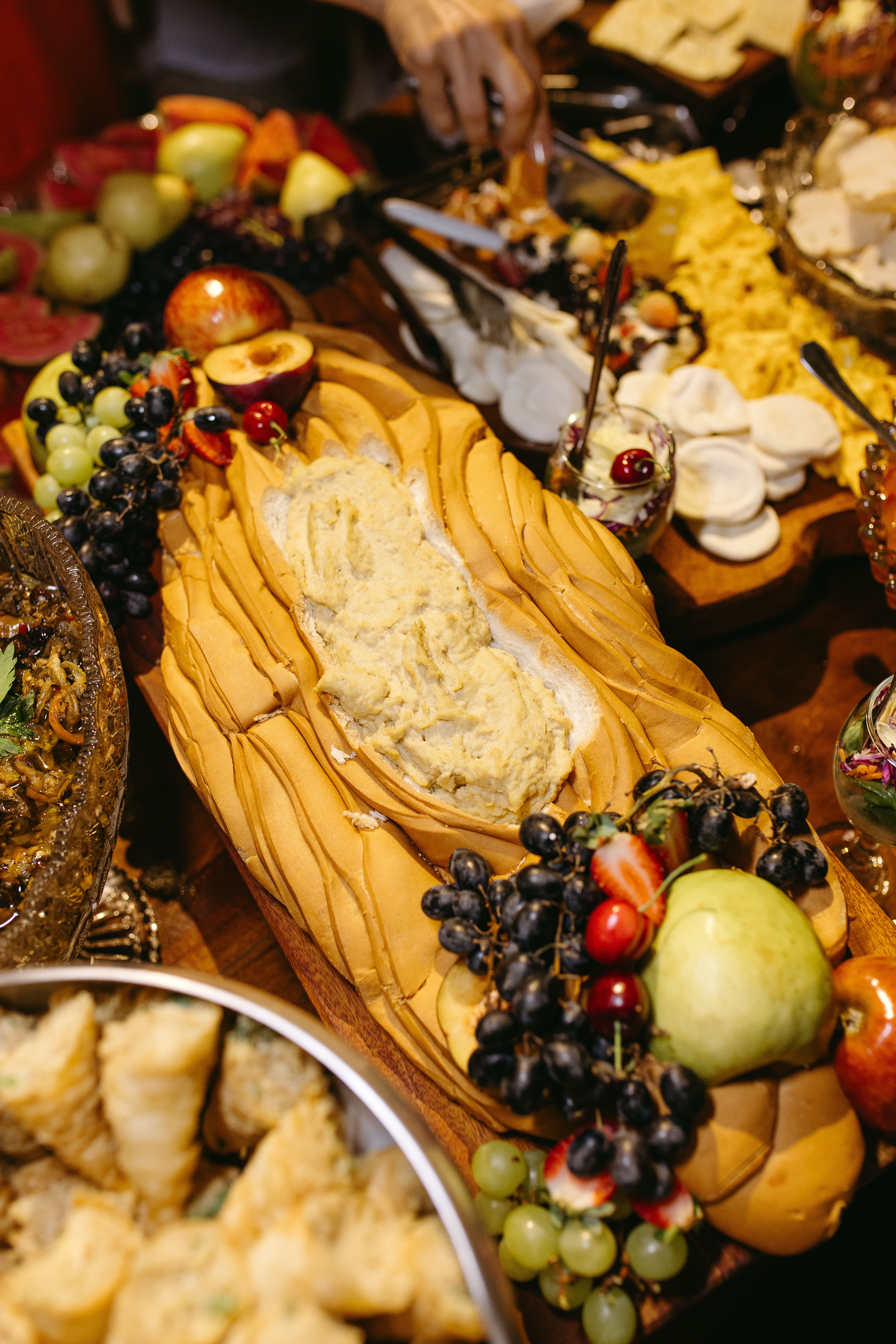 Vibrant Fruit and Cheese Platter on Rustic Table · Free Stock Photo