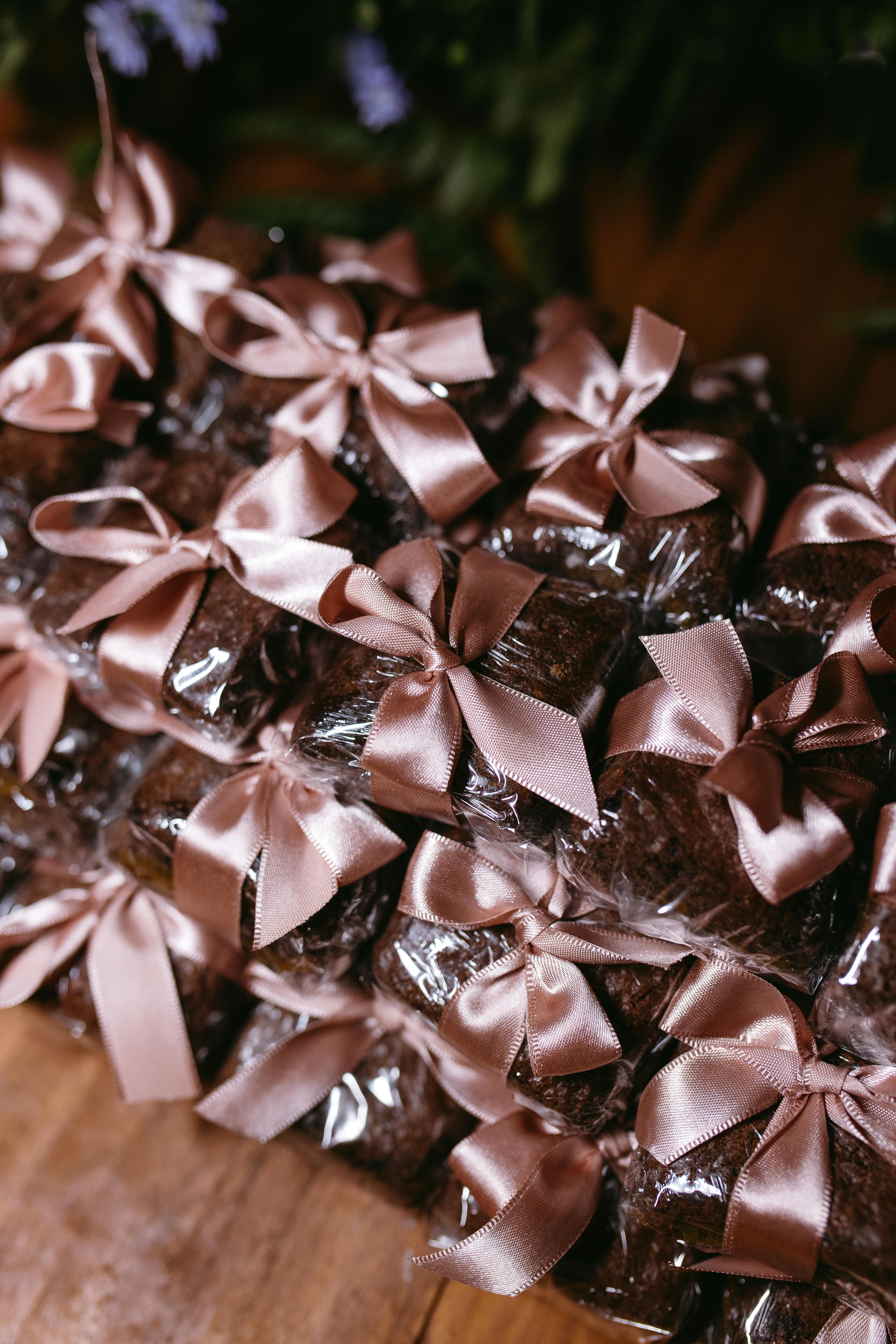 Wrapped Chocolate Brownies with Pink Ribbons · Free Stock Photo