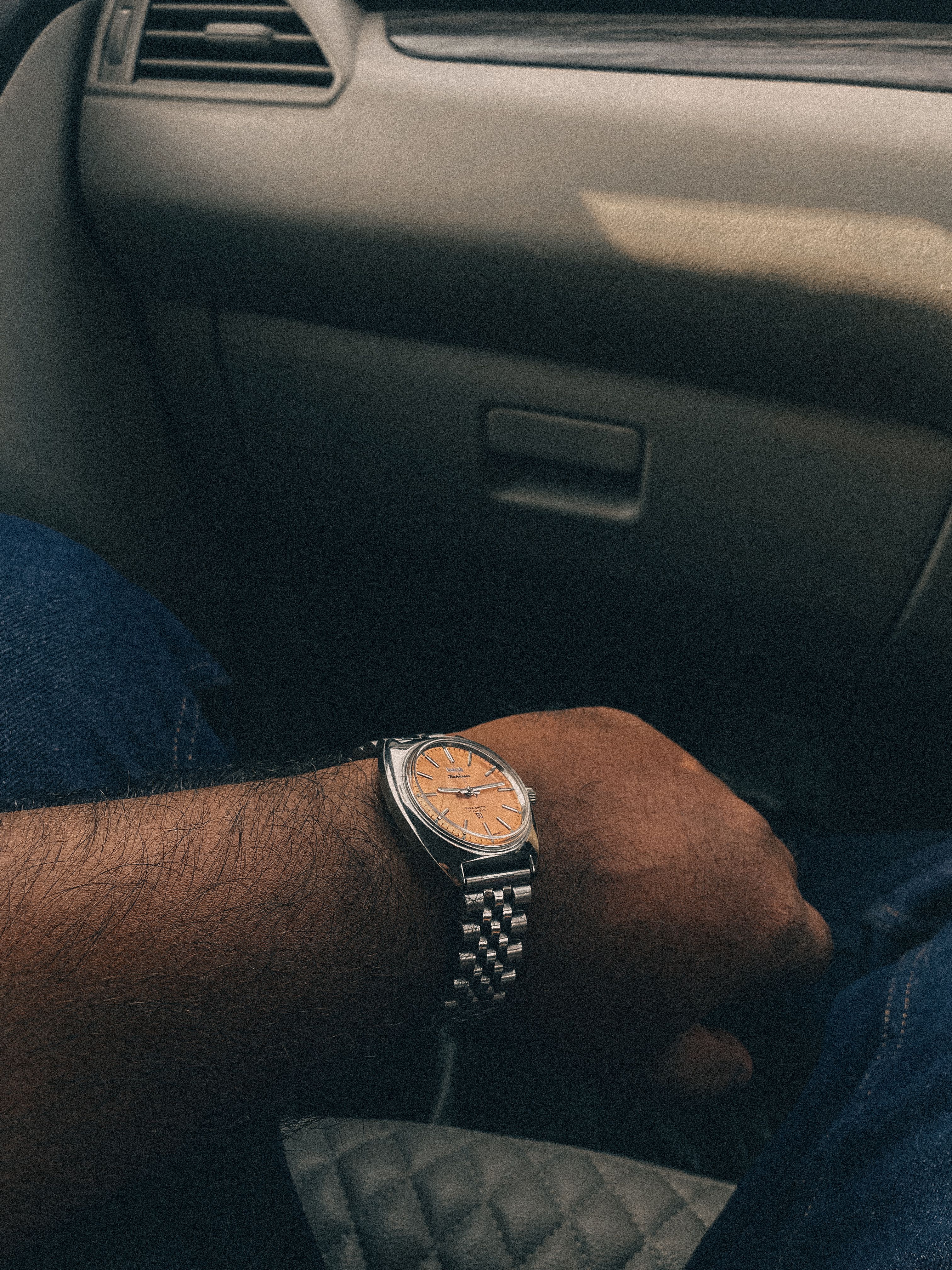 Vintage Analog Watch on Wrist in Car Interior · Free Stock Photo