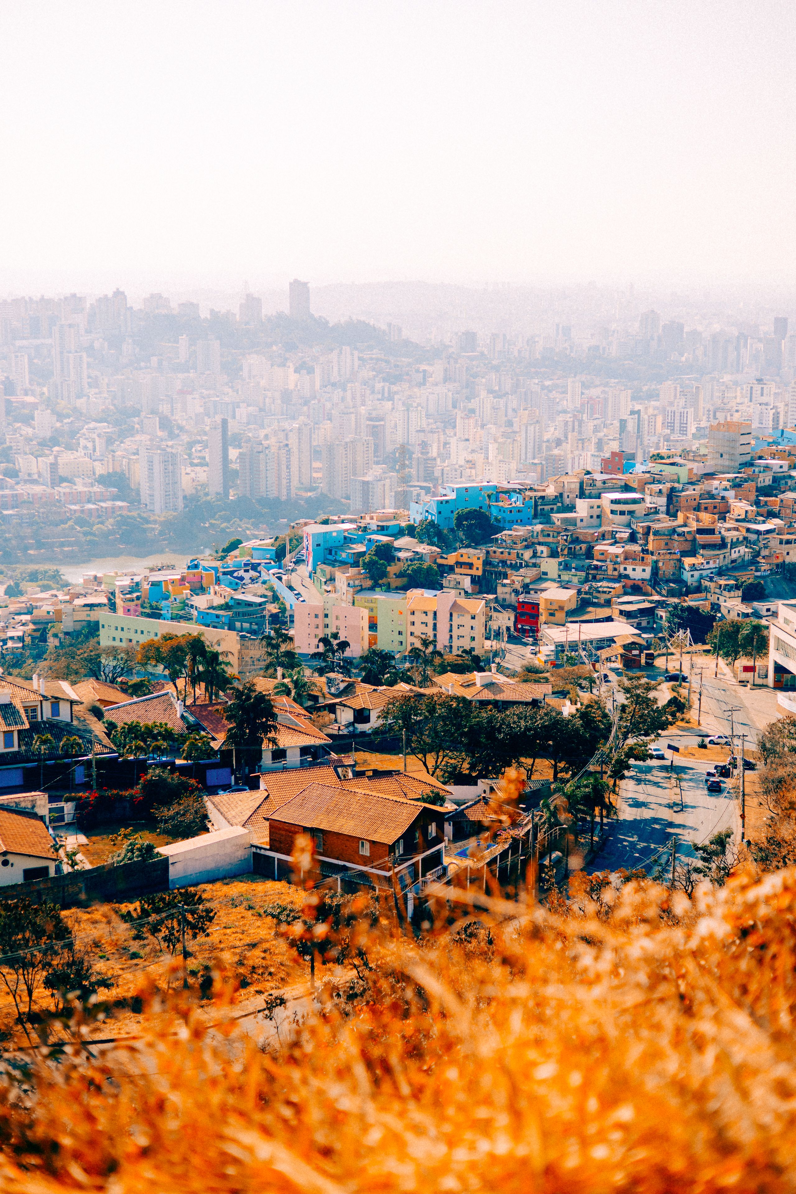 Aerial view of vibrant hillside cityscape · Free Stock Photo