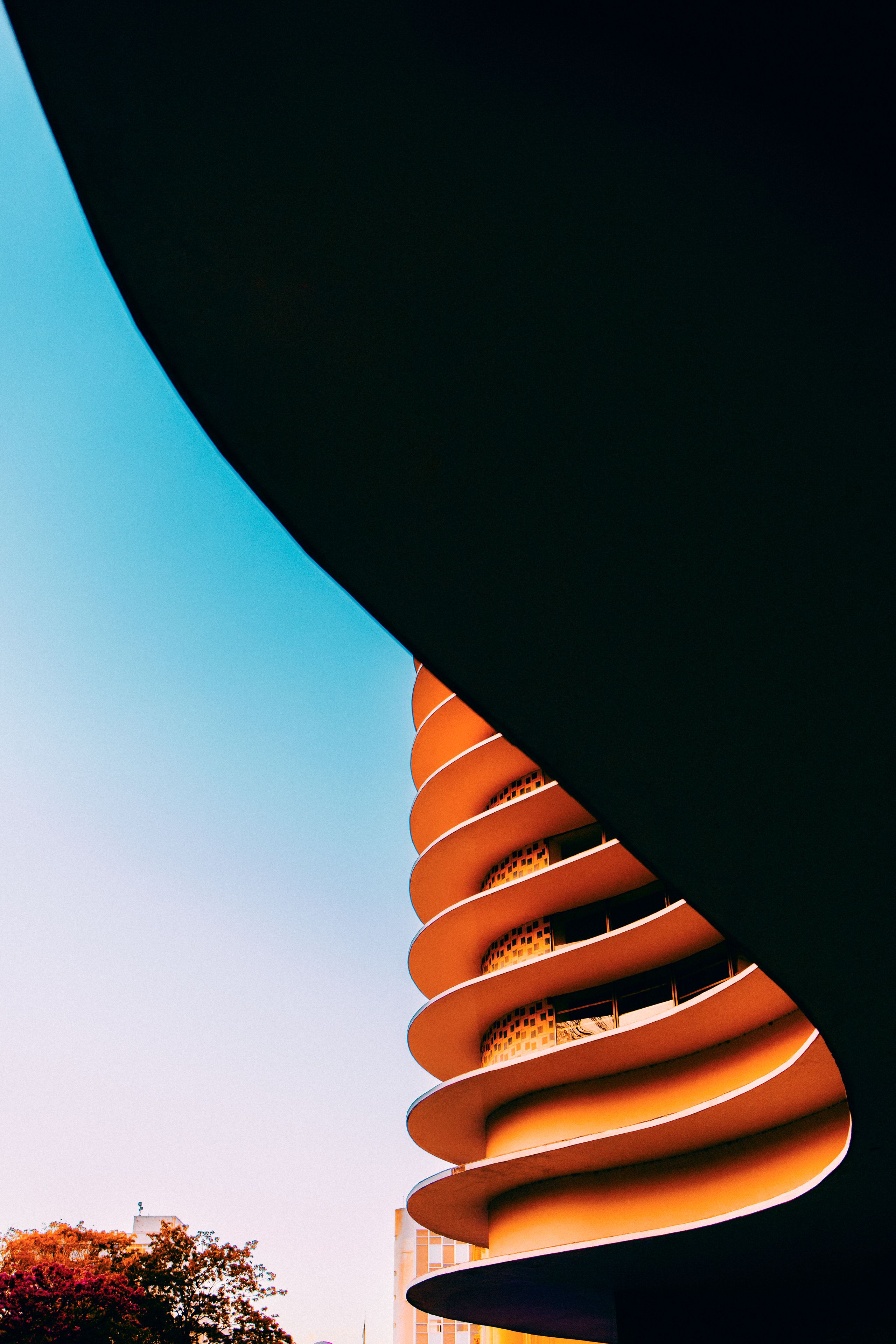 Modern Abstract Architecture Against Blue Sky · Free Stock Photo