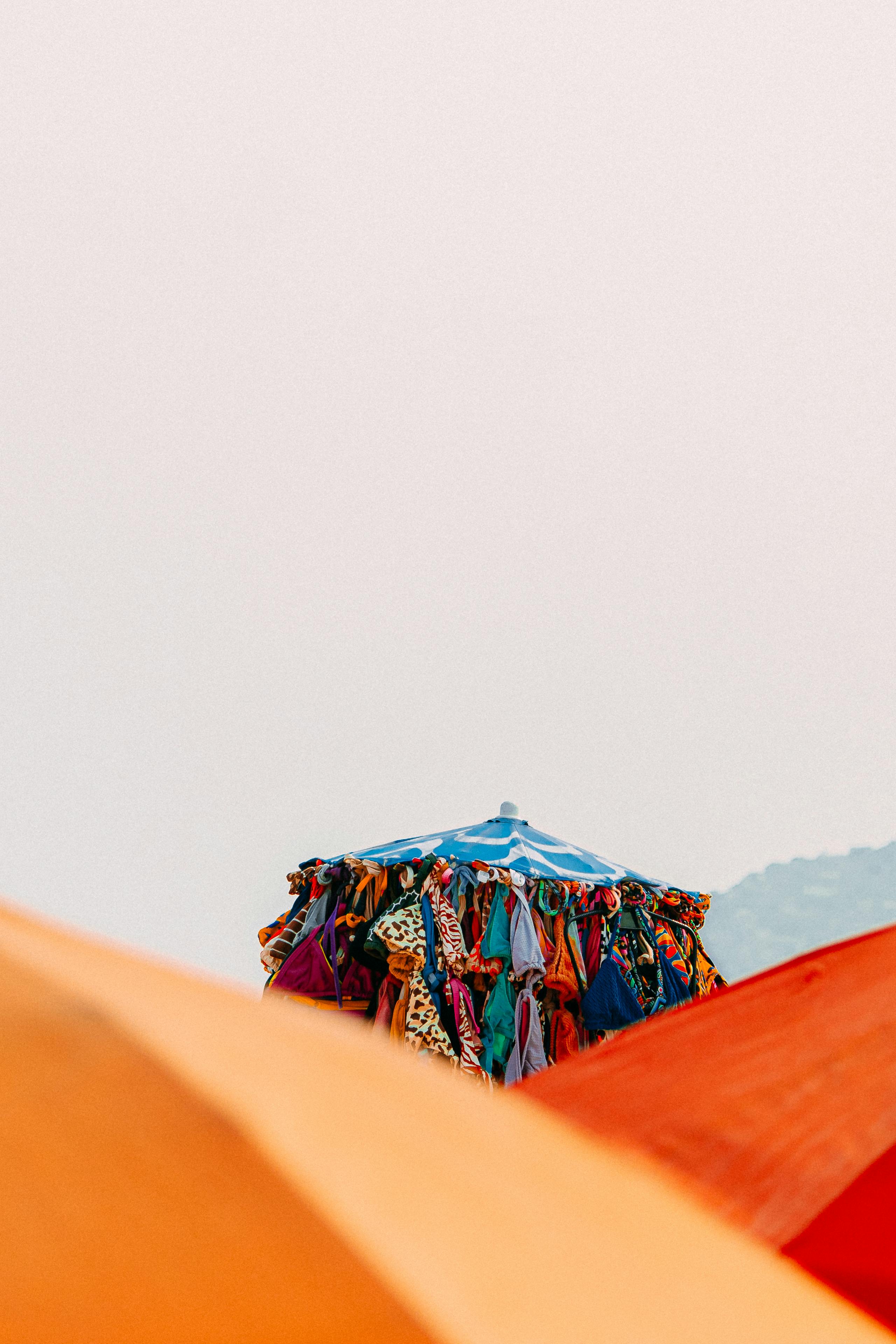 Colorful Umbrella in Beach Setting · Free Stock Photo