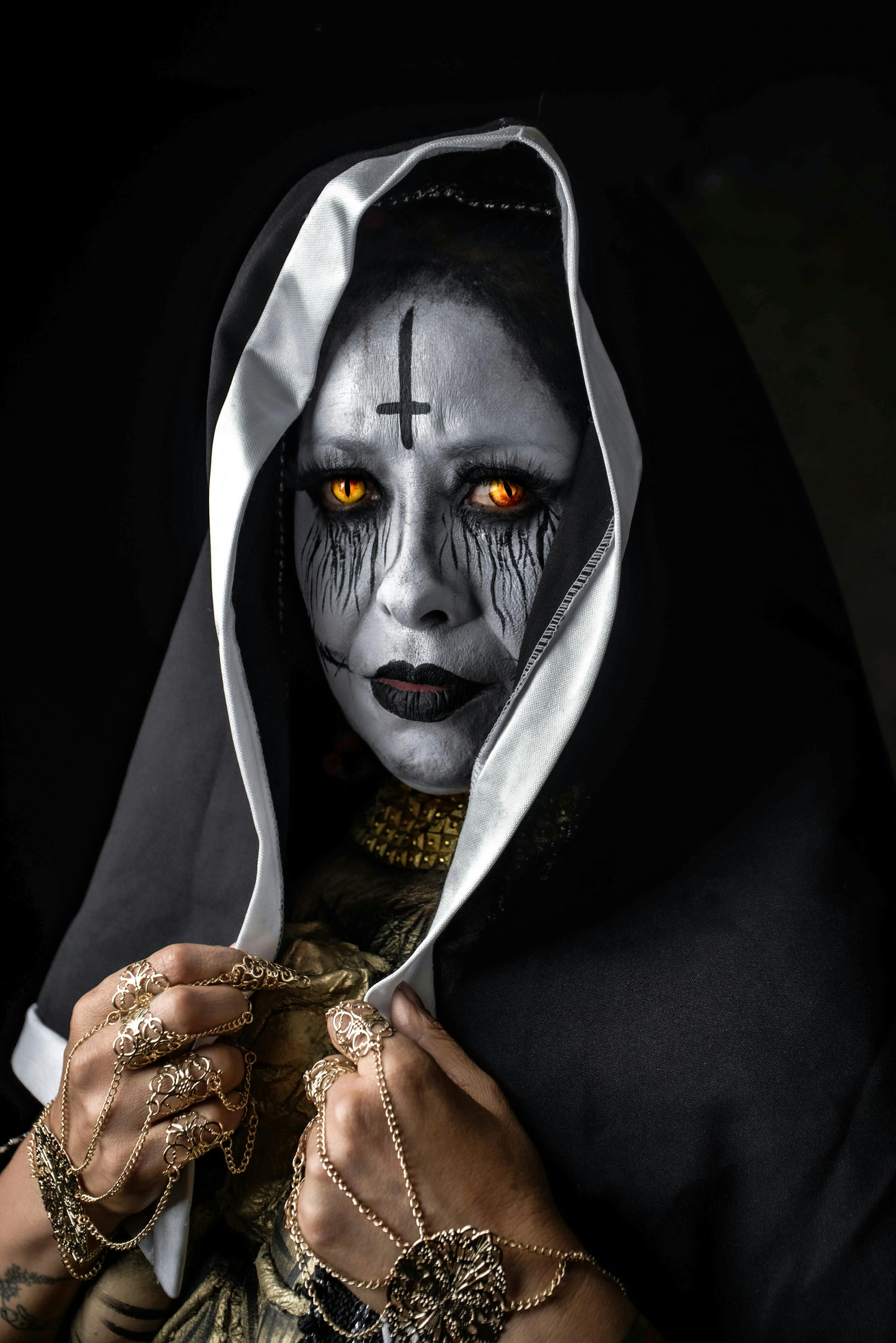 Mysterious Goth Woman with Intense Makeup · Free Stock Photo