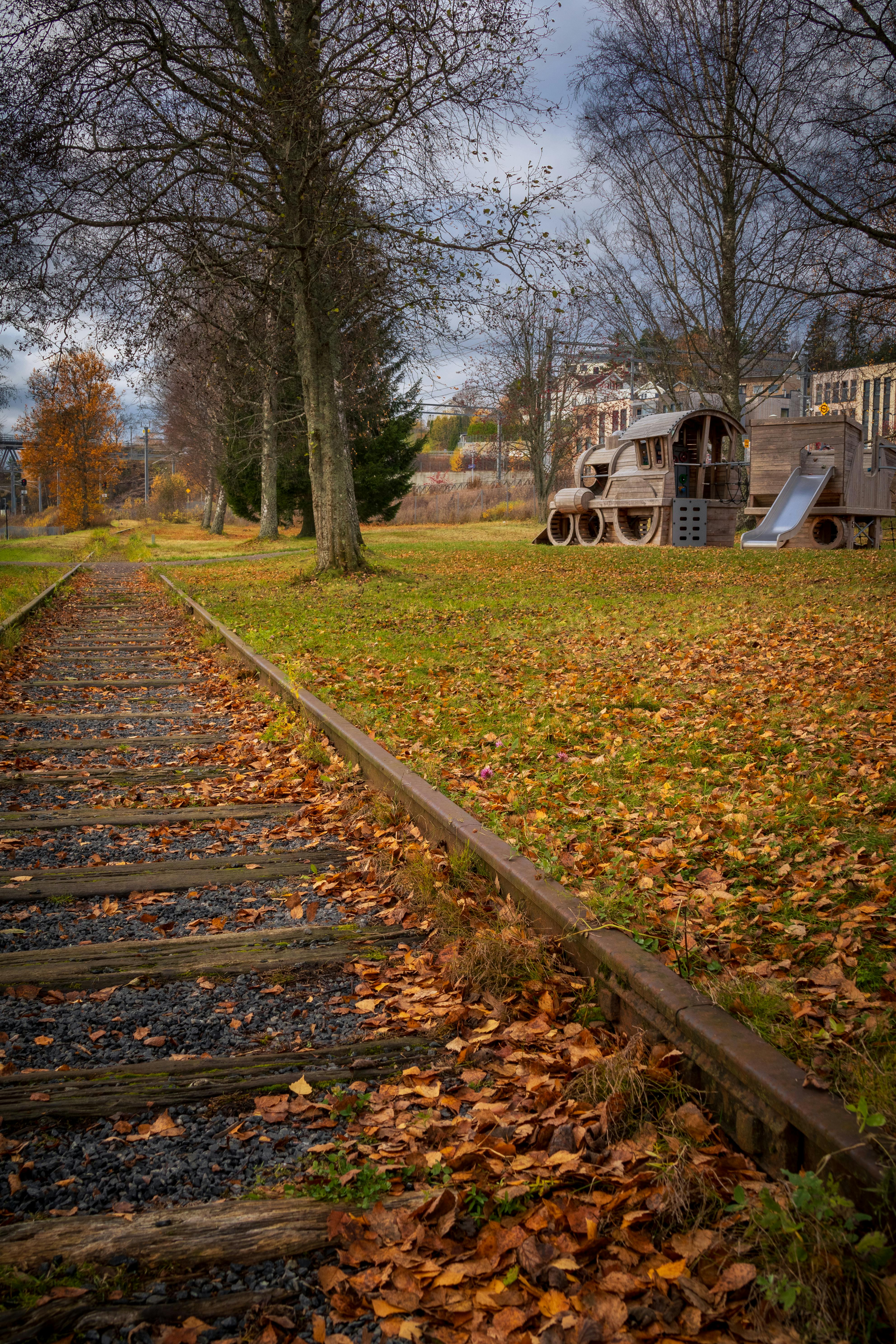 Rustic Playground by Abandoned Railway in Autumn · Free Stock Photo