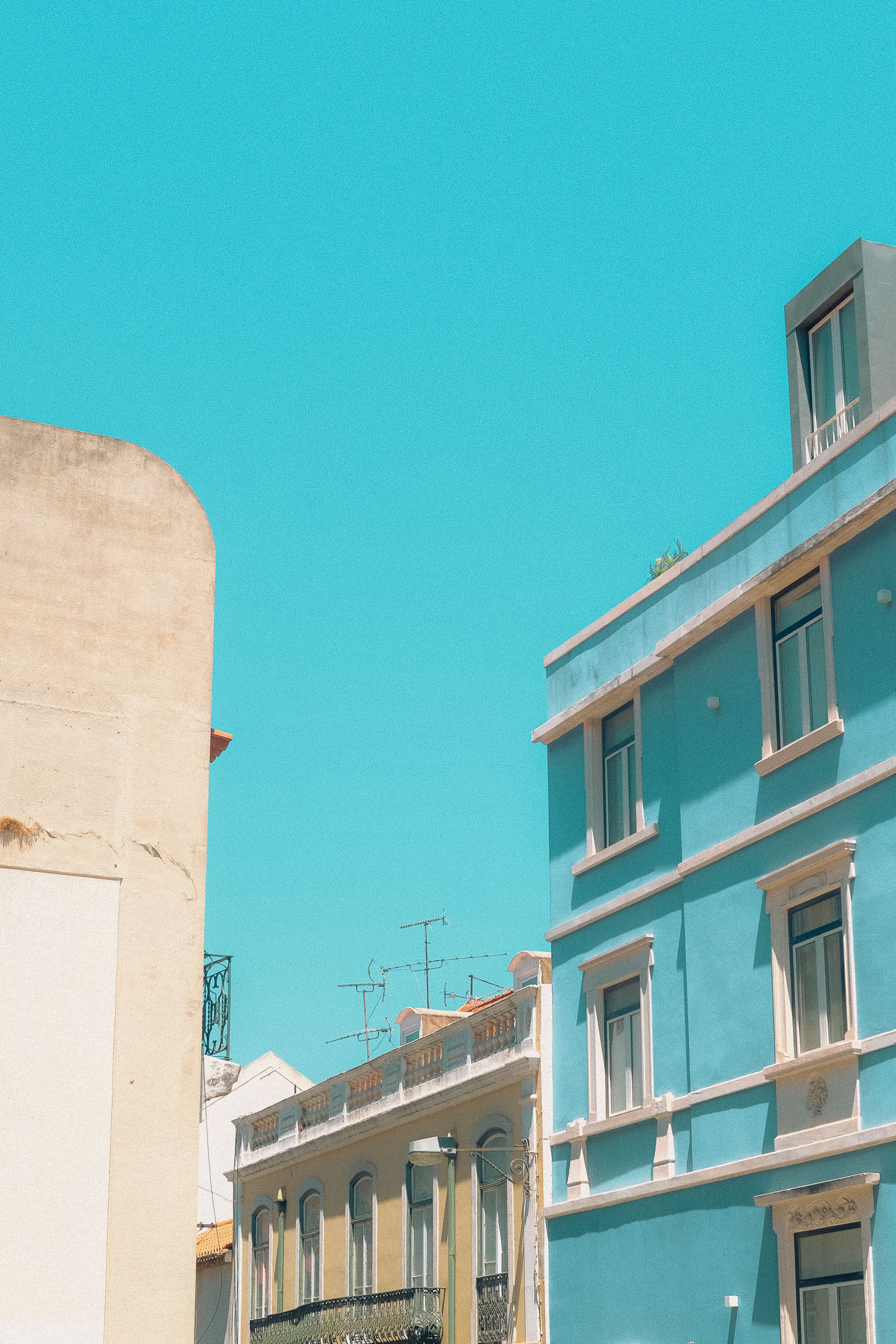 Colorful Mediterranean Architecture Against Blue Sky · Free Stock Photo