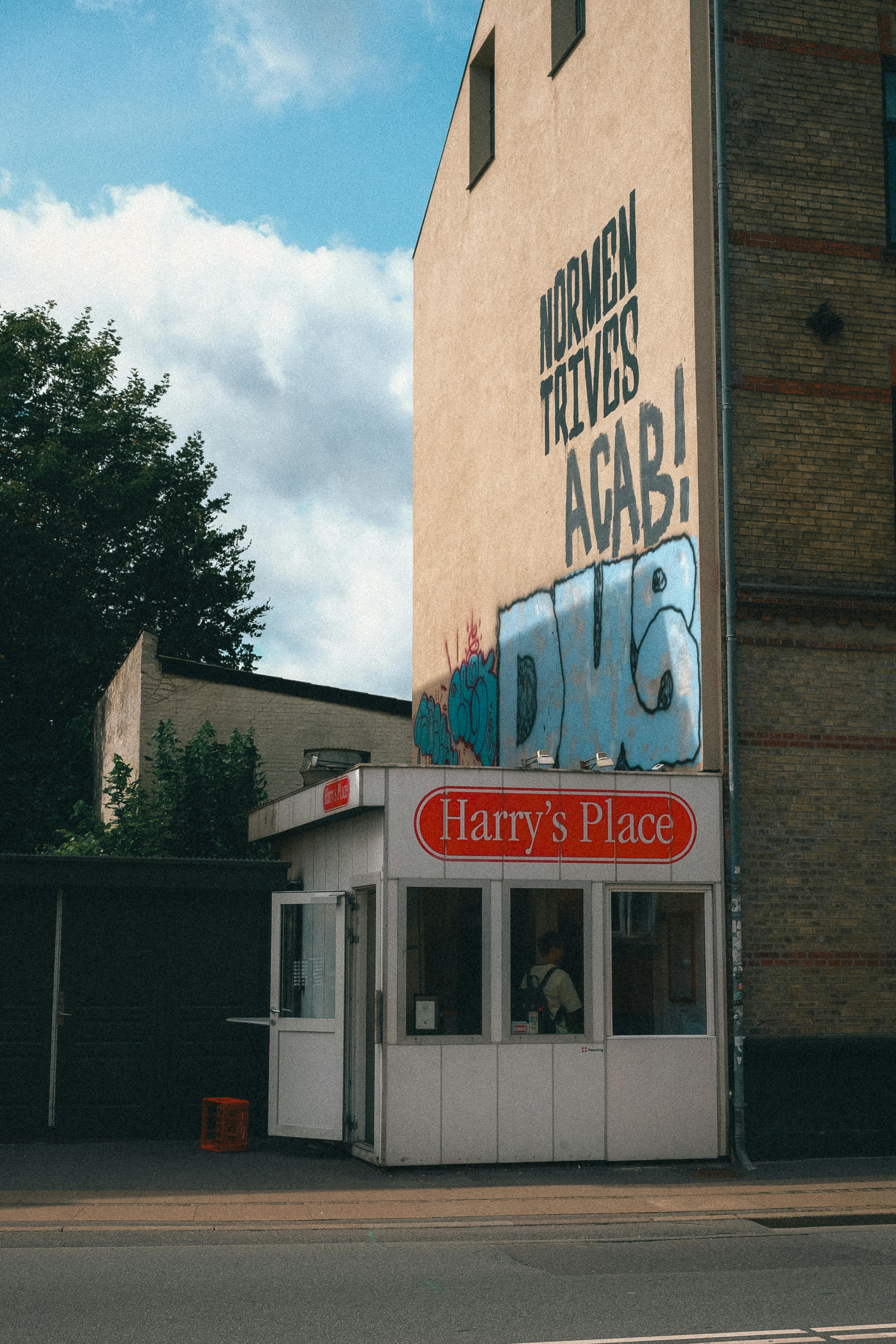 Copenhagen Street Scene with Graffiti and Kiosk · Free Stock Photo