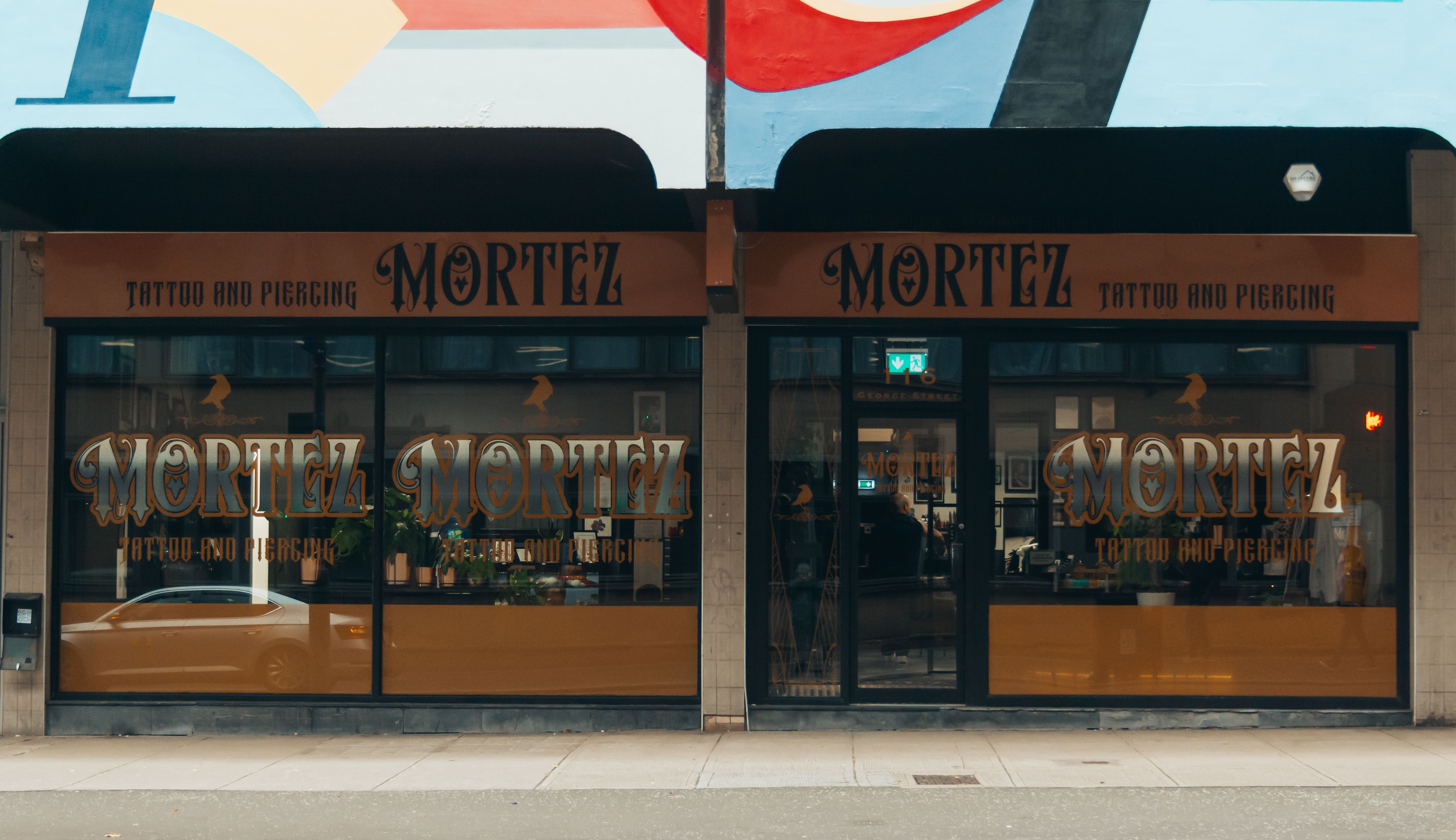Vintage Tattoo and Piercing Shop Front · Free Stock Photo