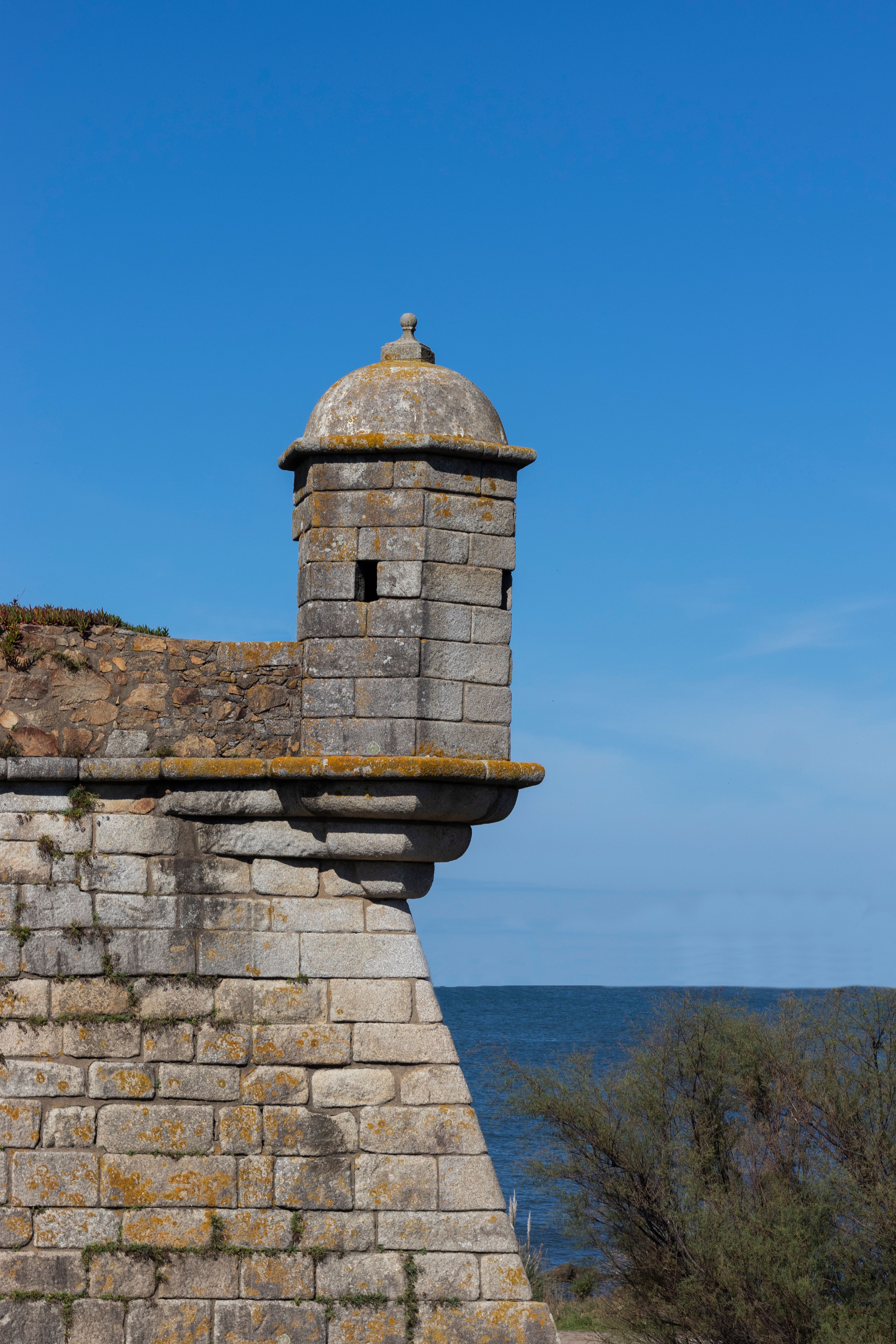 Historic Stone Tower in Porto Overlooking Ocean · Free Stock Photo