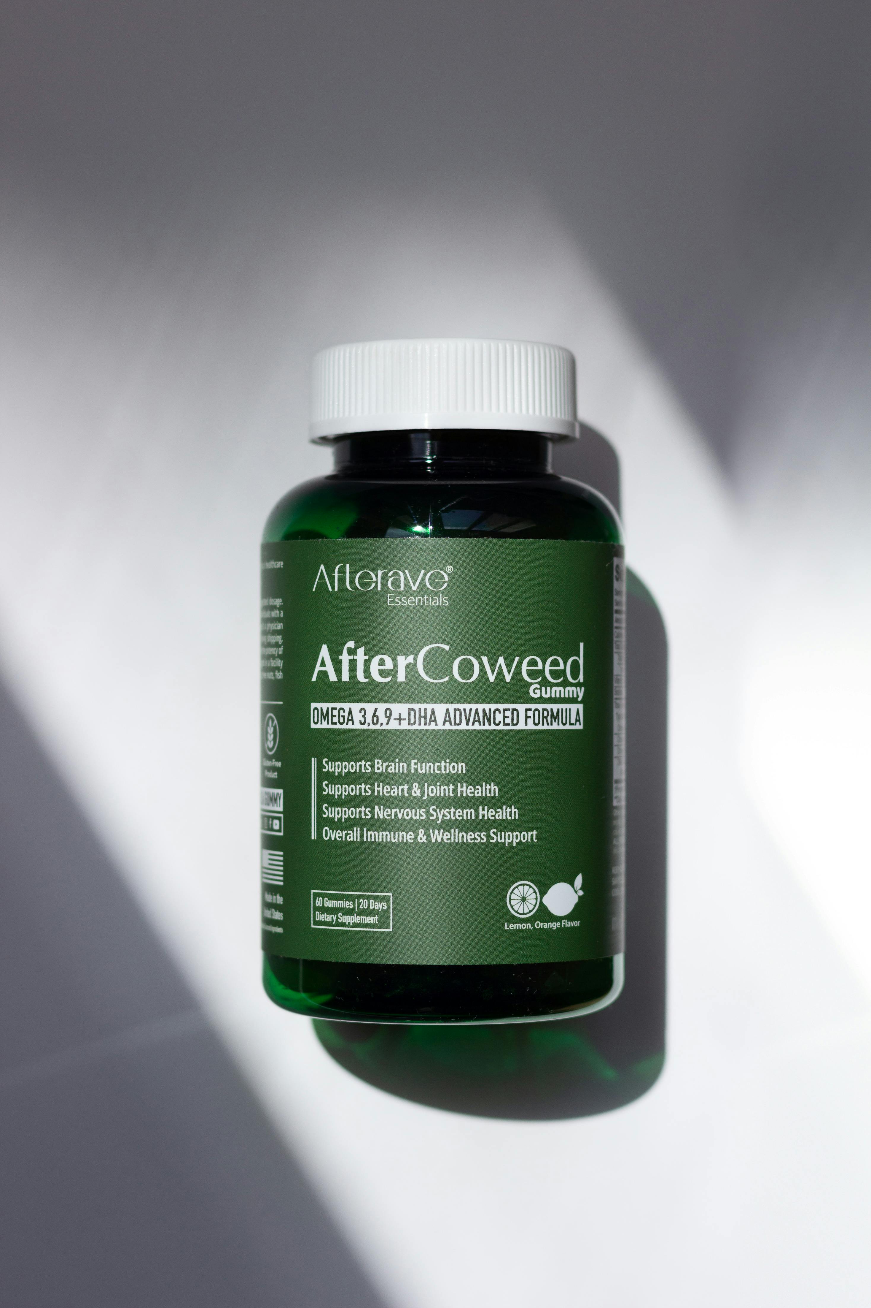 AfterCoweed Omega 3,6,9 + DHA Supplement Bottle · Free Stock Photo