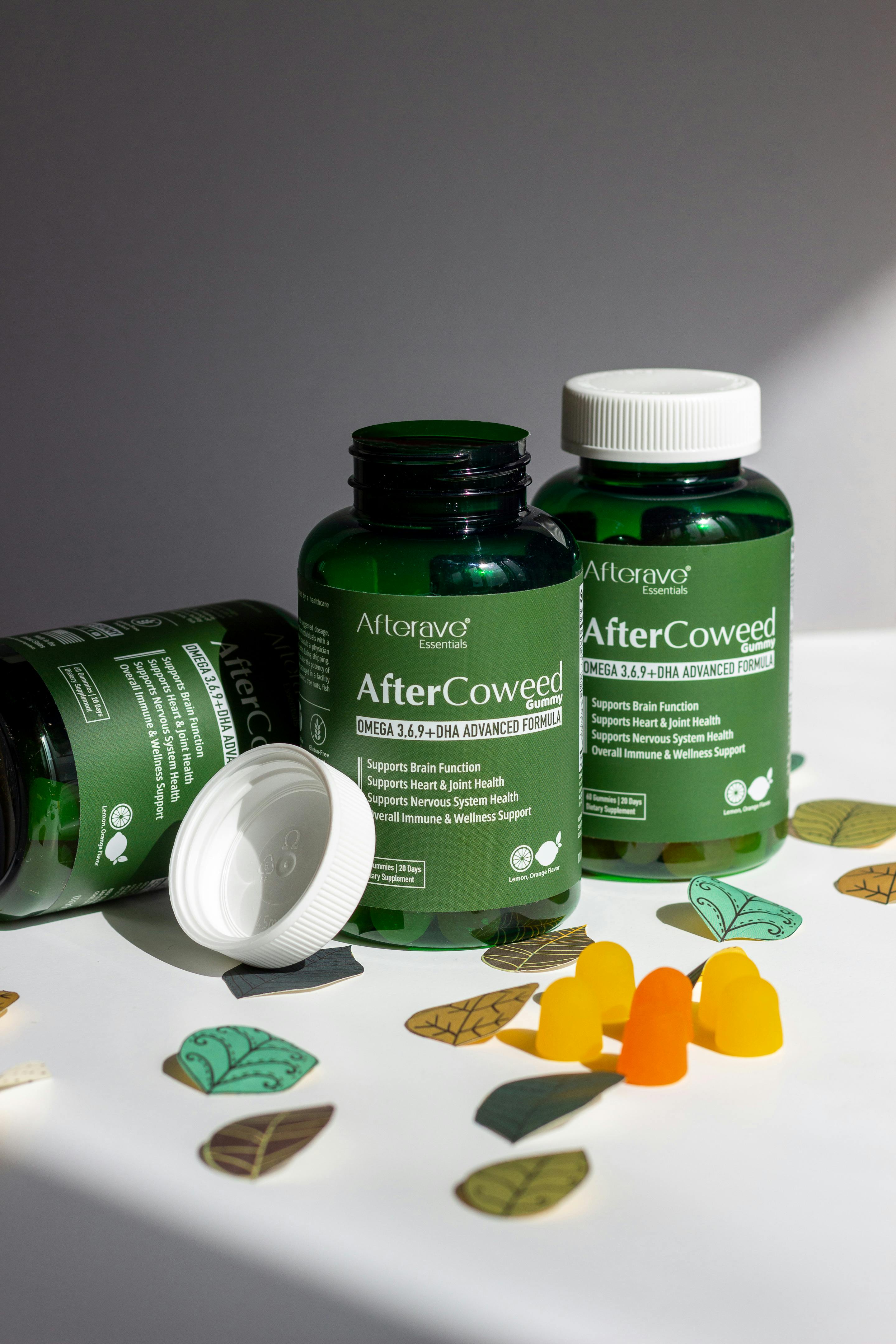 AfterCoweed Supplement Bottles and Gummies · Free Stock Photo