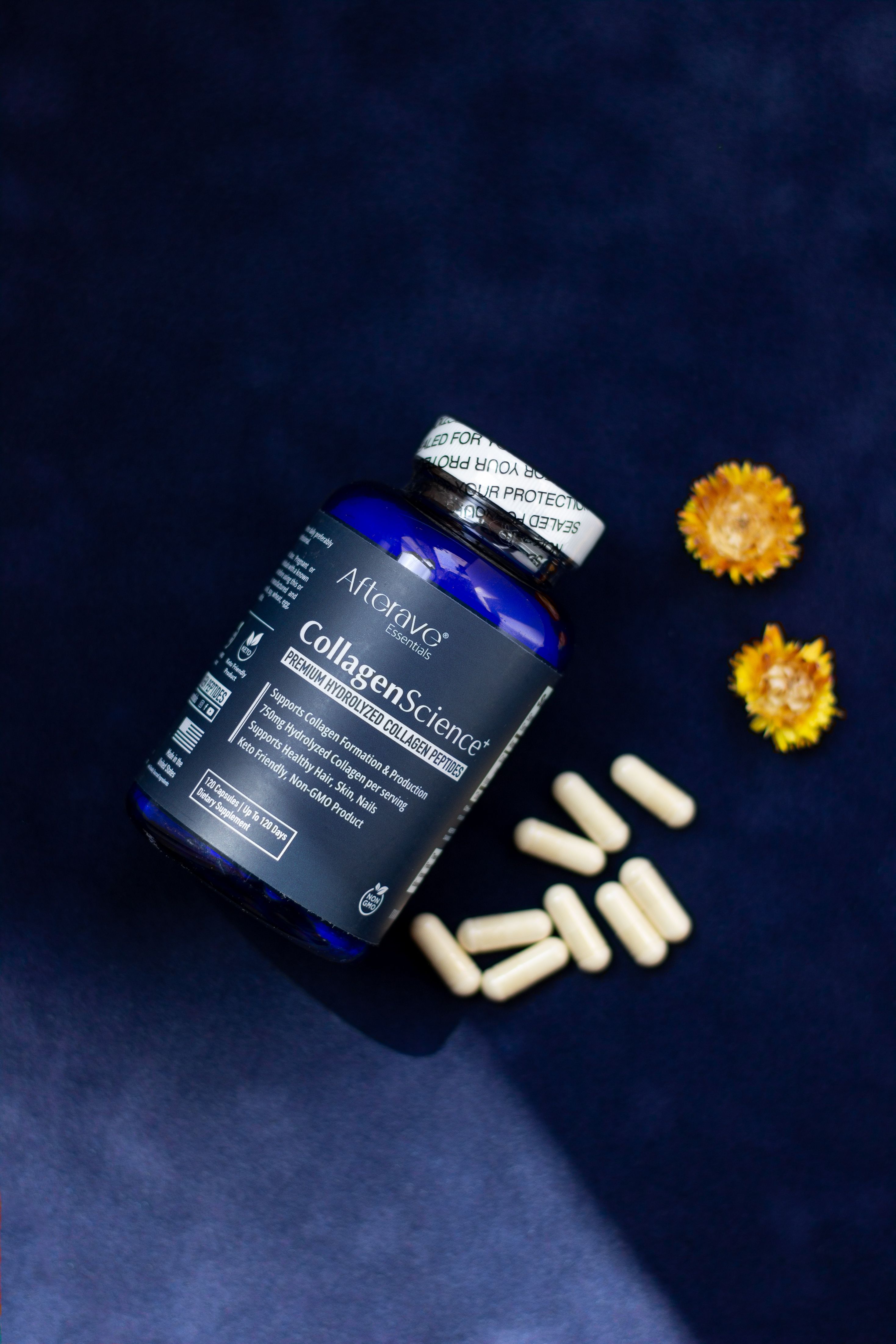 Collagen Supplement with Capsules and Flowers · Free Stock Photo