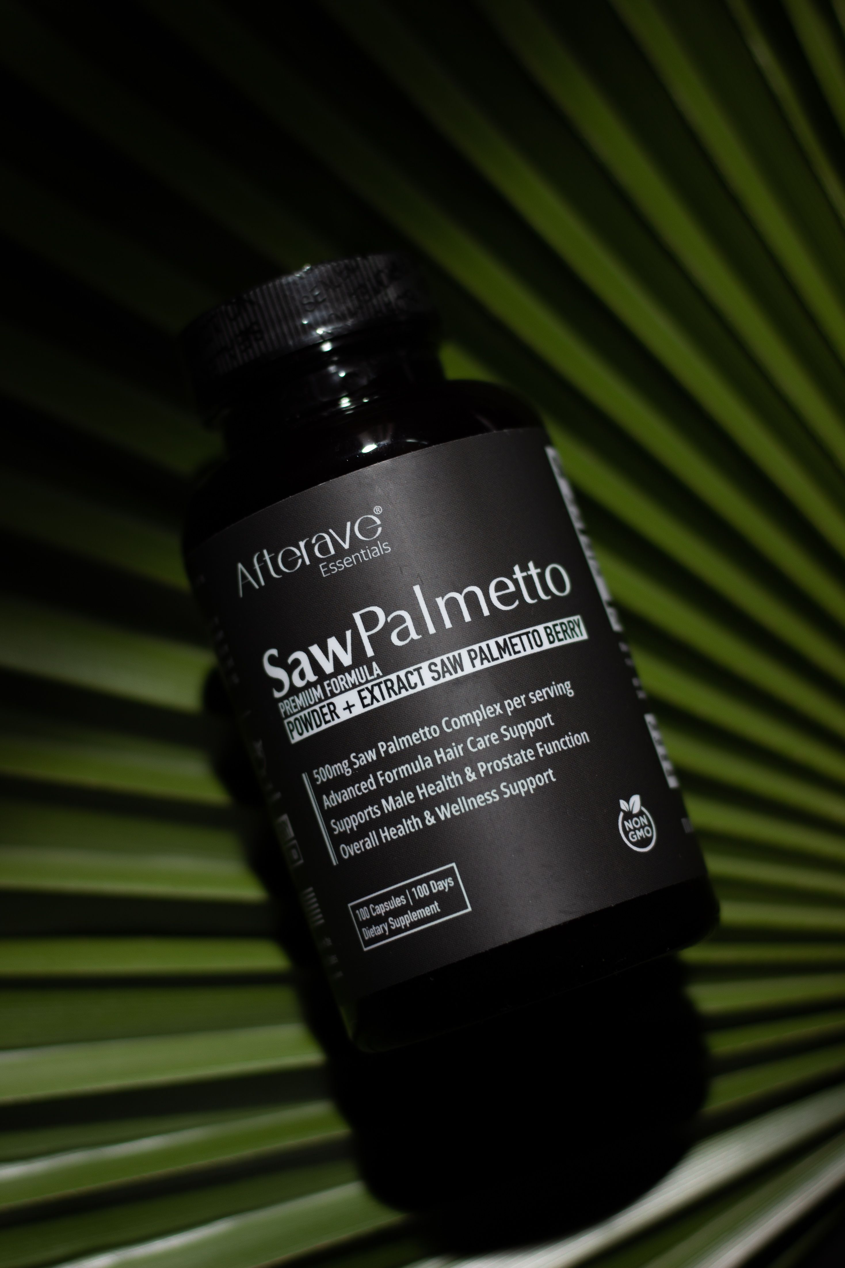 Saw Palmetto Supplement on Tropical Leaf · Free Stock Photo