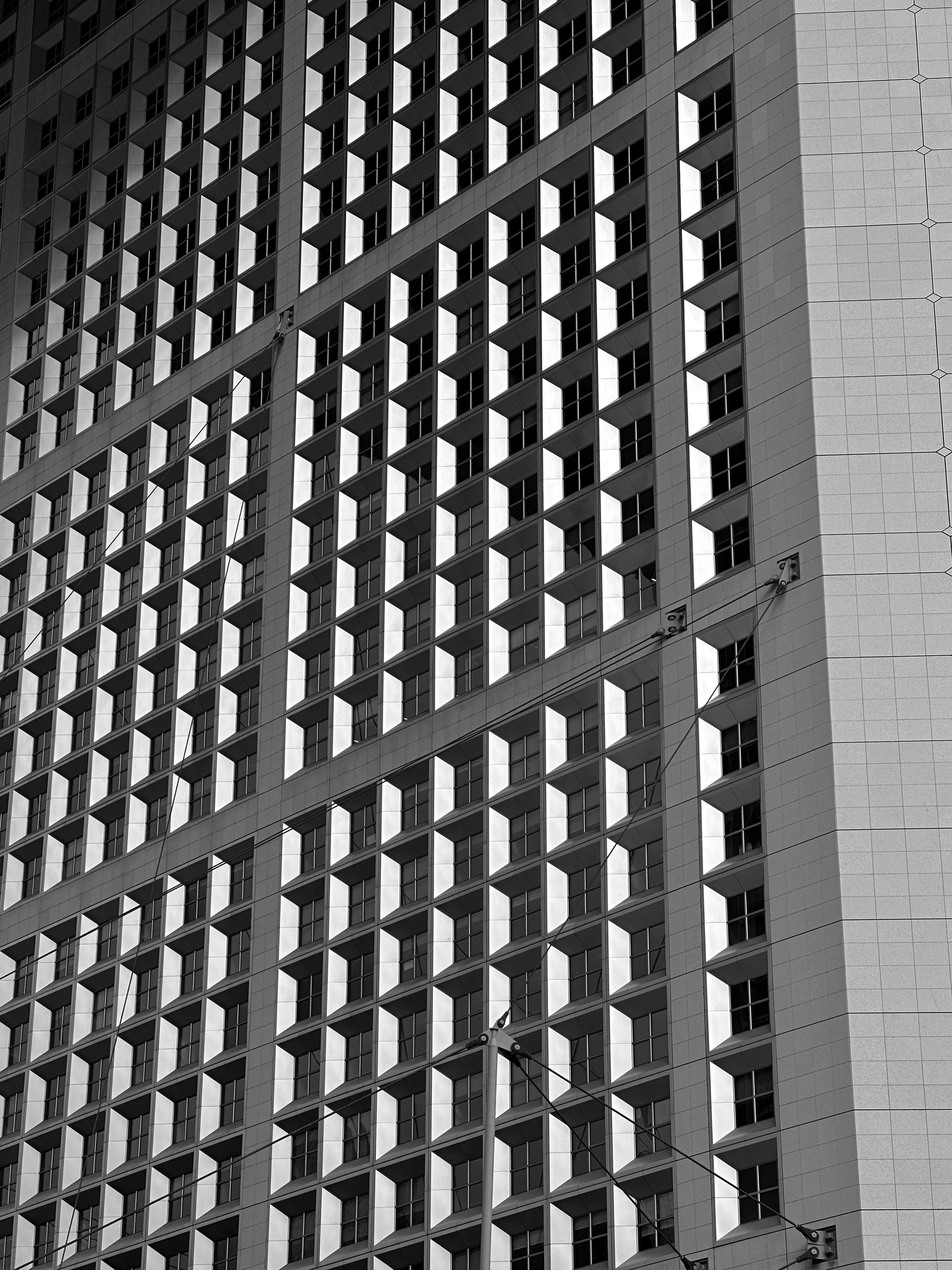 Abstract Black and White Shadowed Brick Wall · Free Stock Photo