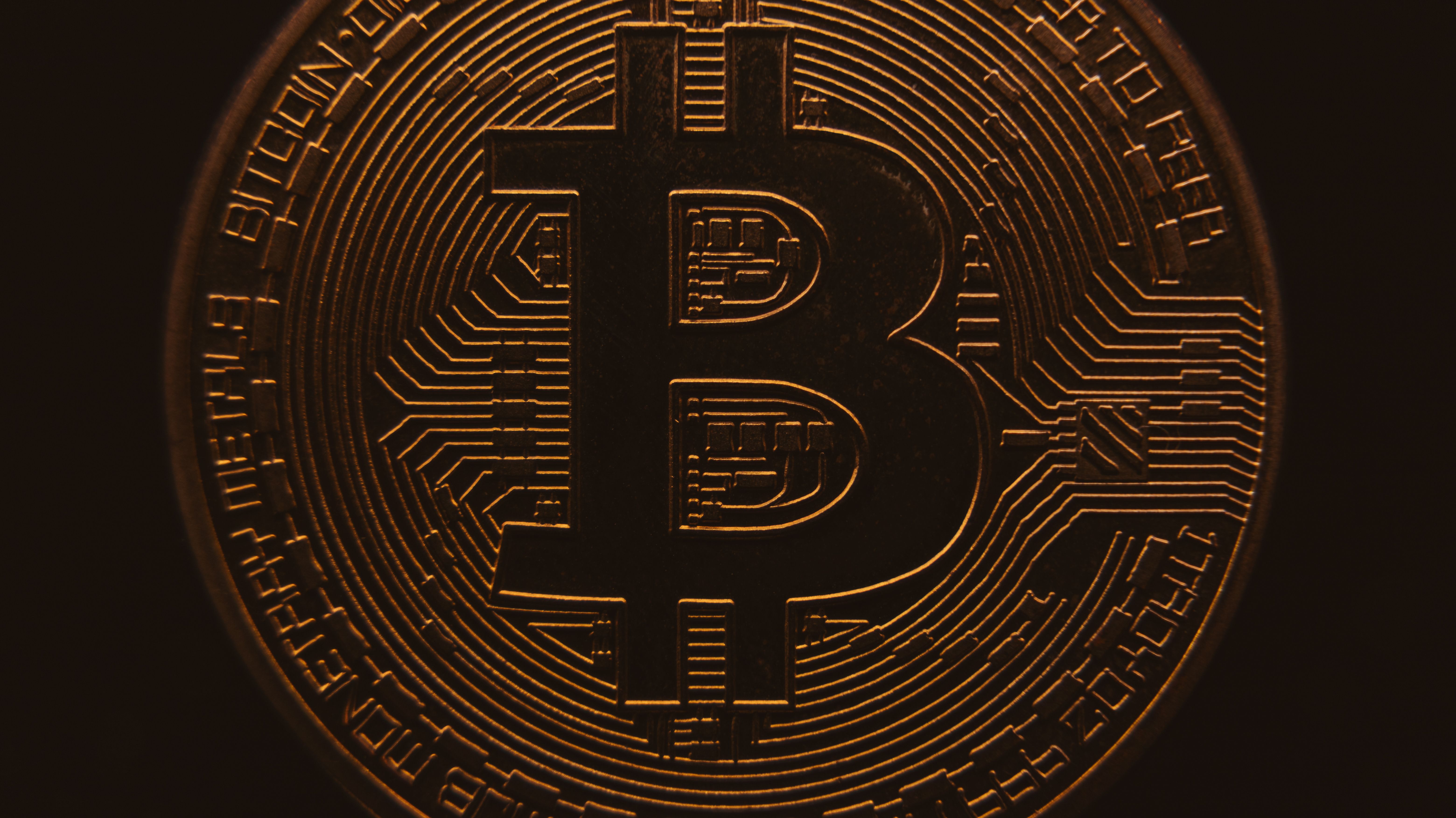 Close-up Image of a Bitcoin in Dark Setting · Free Stock Photo