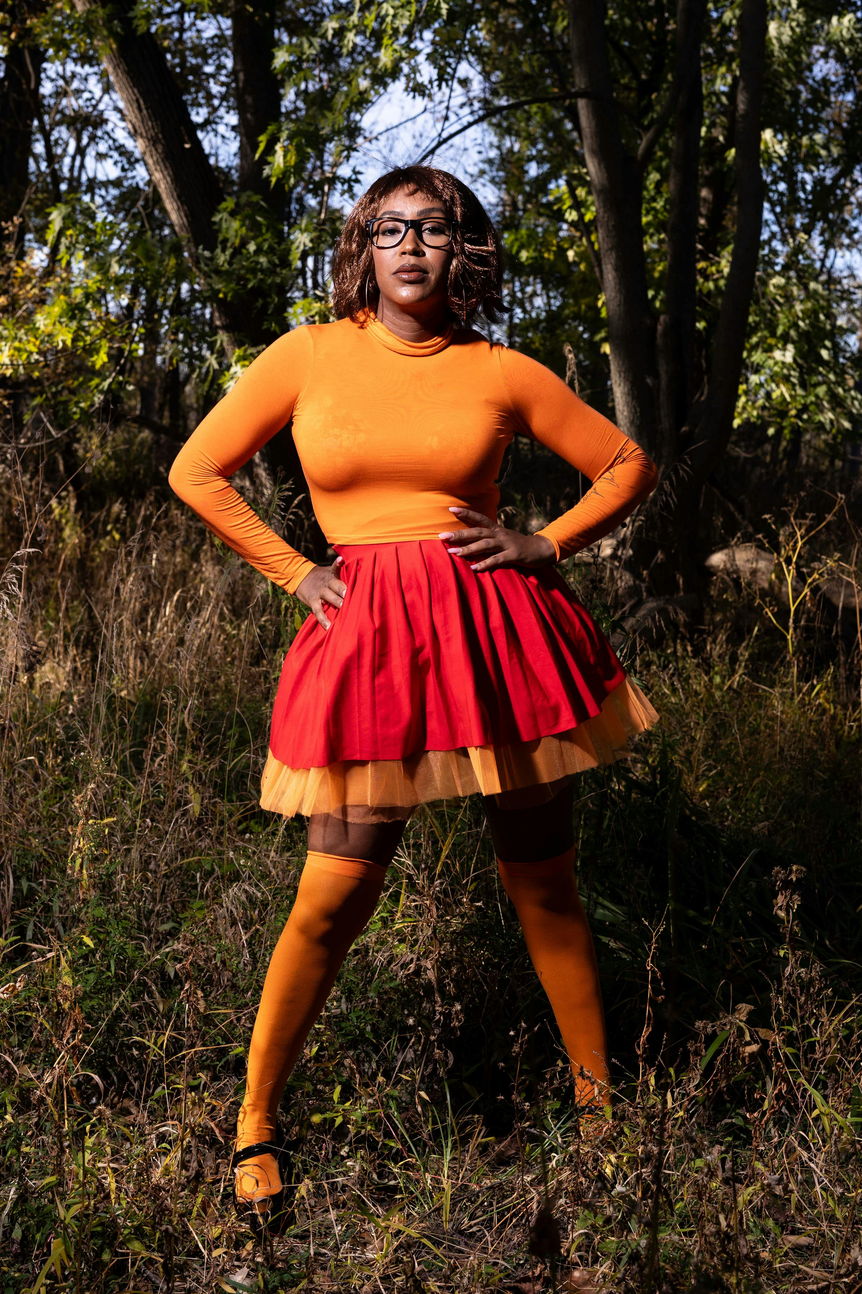 Vibrant Velma Cosplay in Autumn Forest · Free Stock Photo