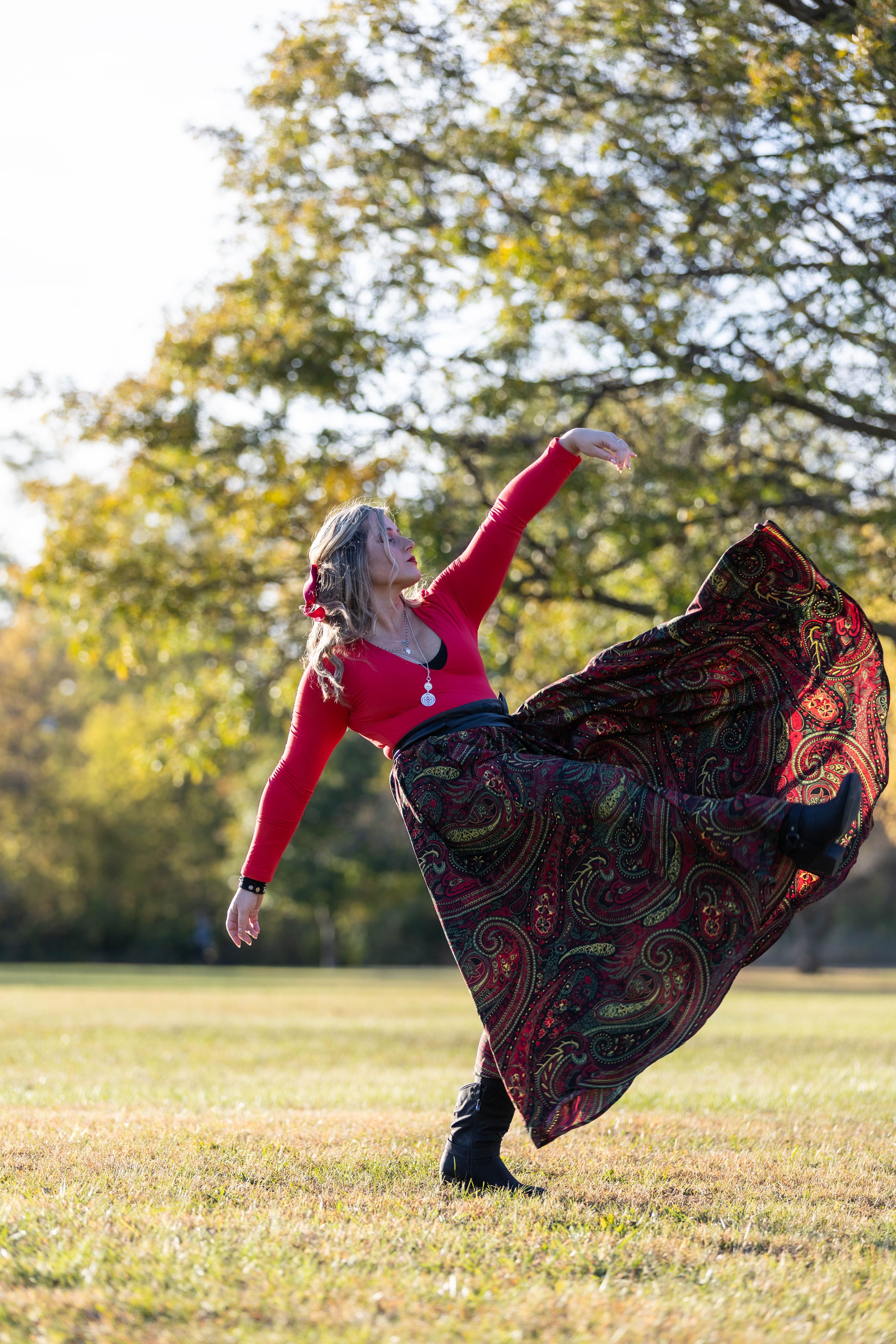 Graceful Woman Dancing Outdoors in Vibrant Attire · Free Stock Photo