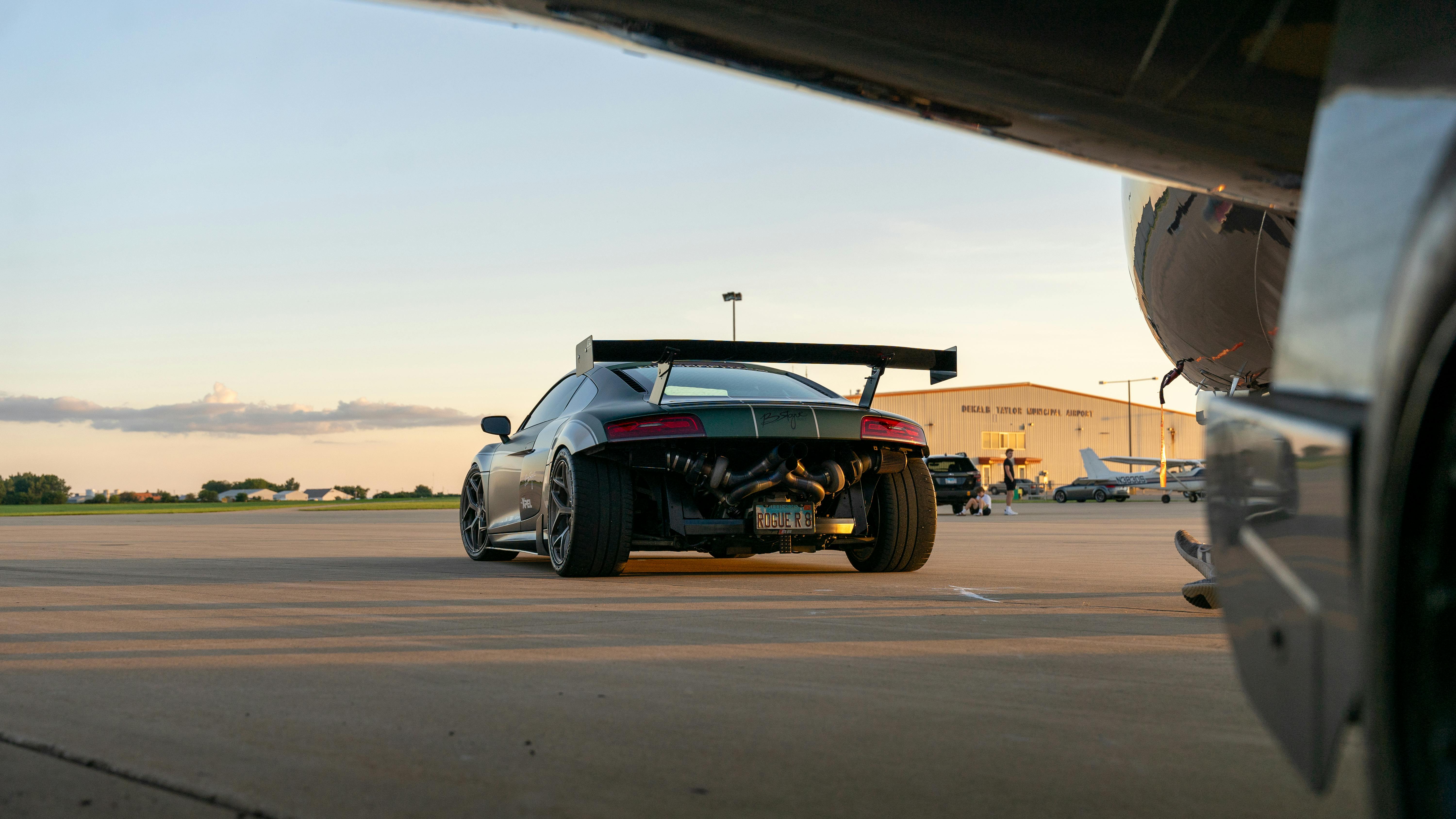 Luxury Car and Private Jet on Airport Tarmac · Free Stock Photo