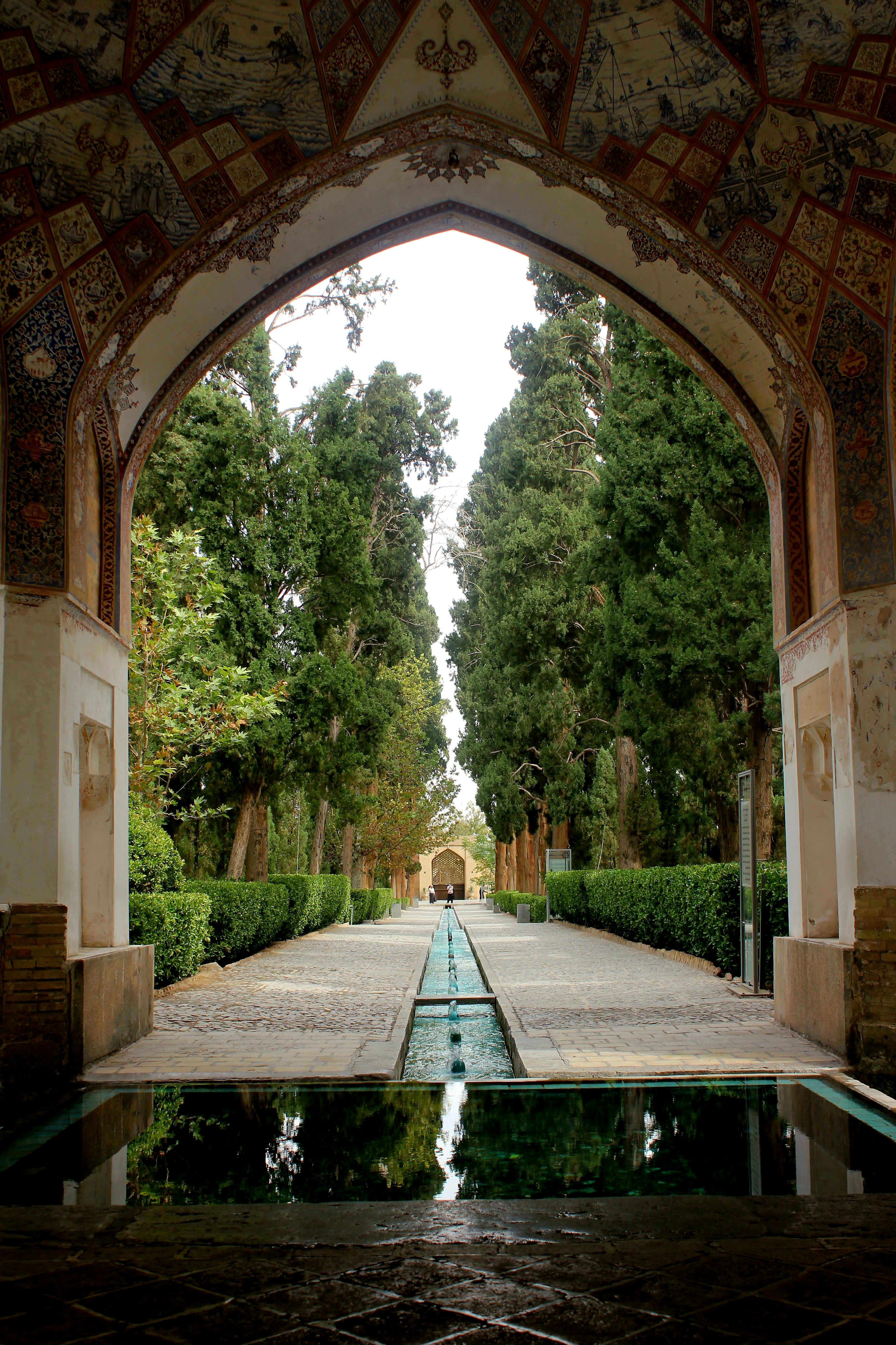 Beautiful Persian Garden with Traditional Arch · Free Stock Photo