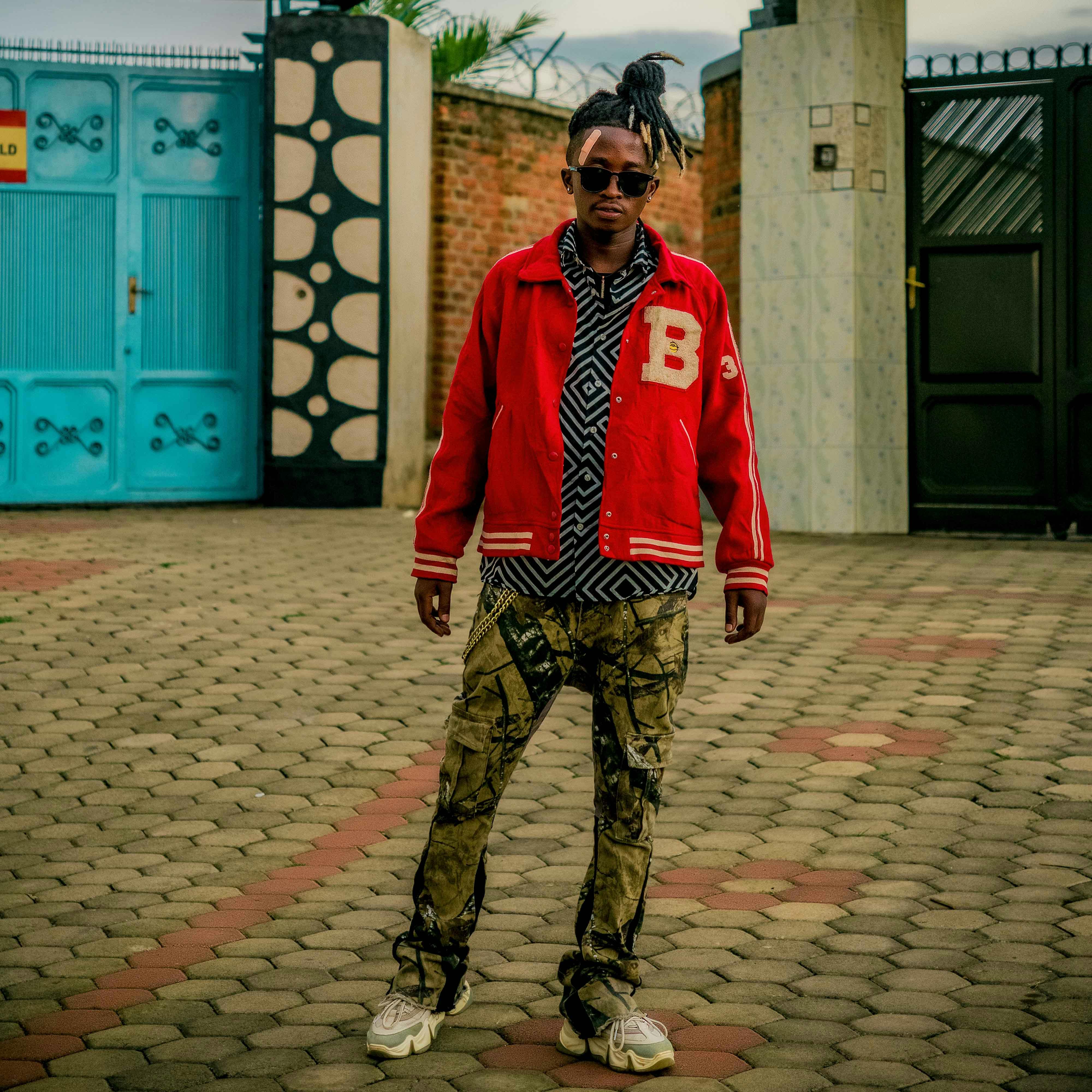 Fashionable Individual Posing Outdoors in Urban Setting · Free Stock Photo