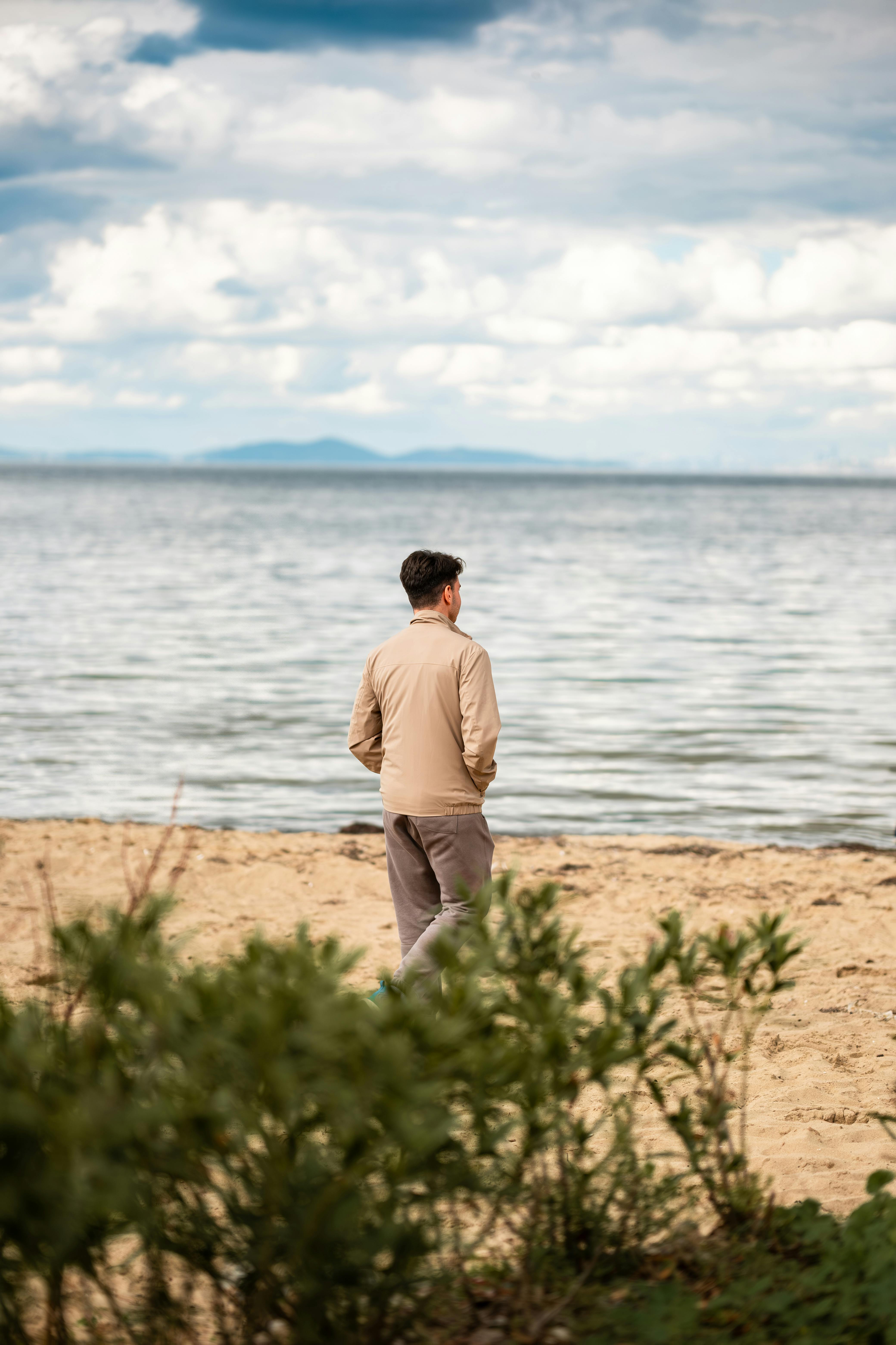 Man Contemplating the Sea at Yalova Beach · Free Stock Photo