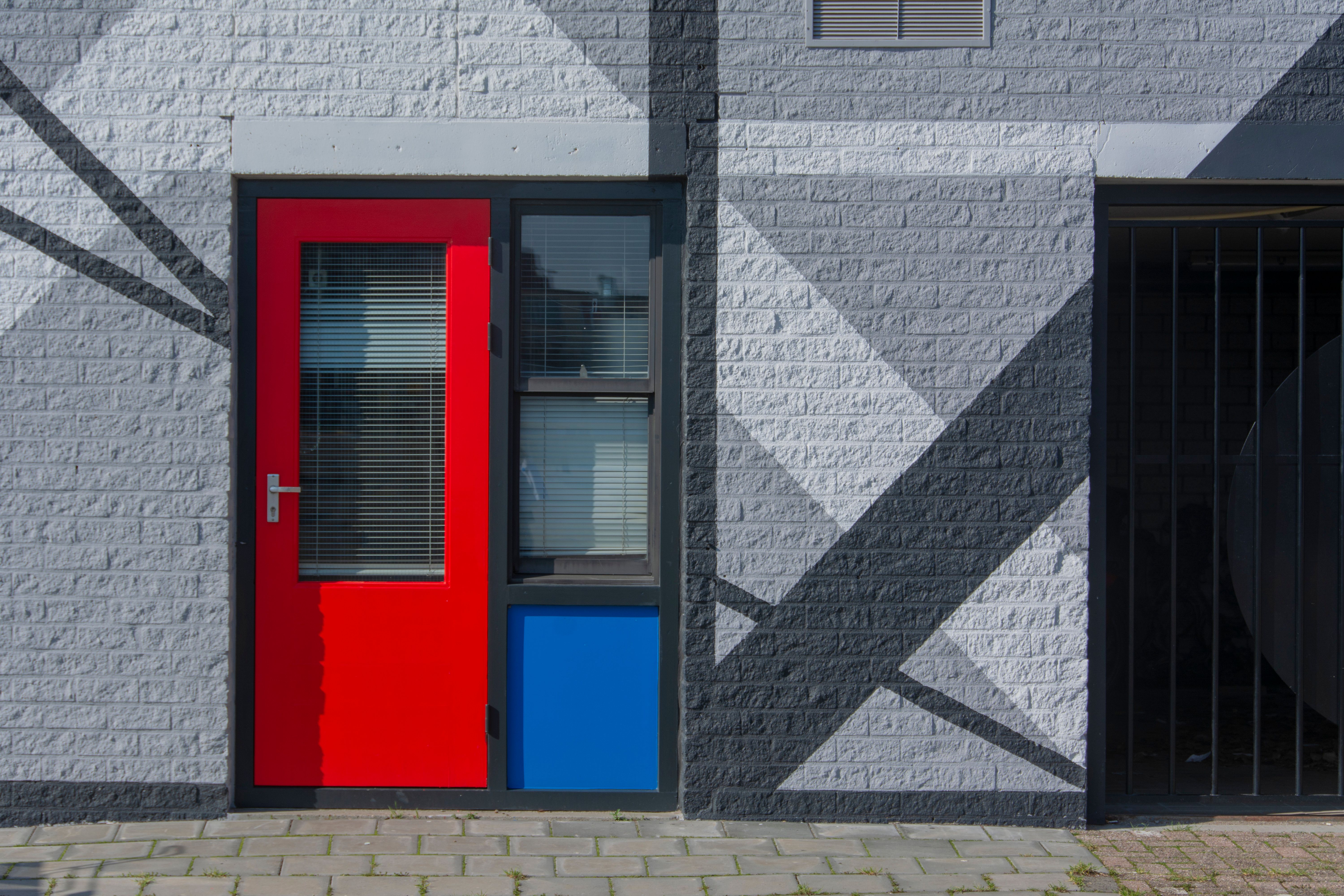 Colorful Modern Door with Geometric Shadows · Free Stock Photo
