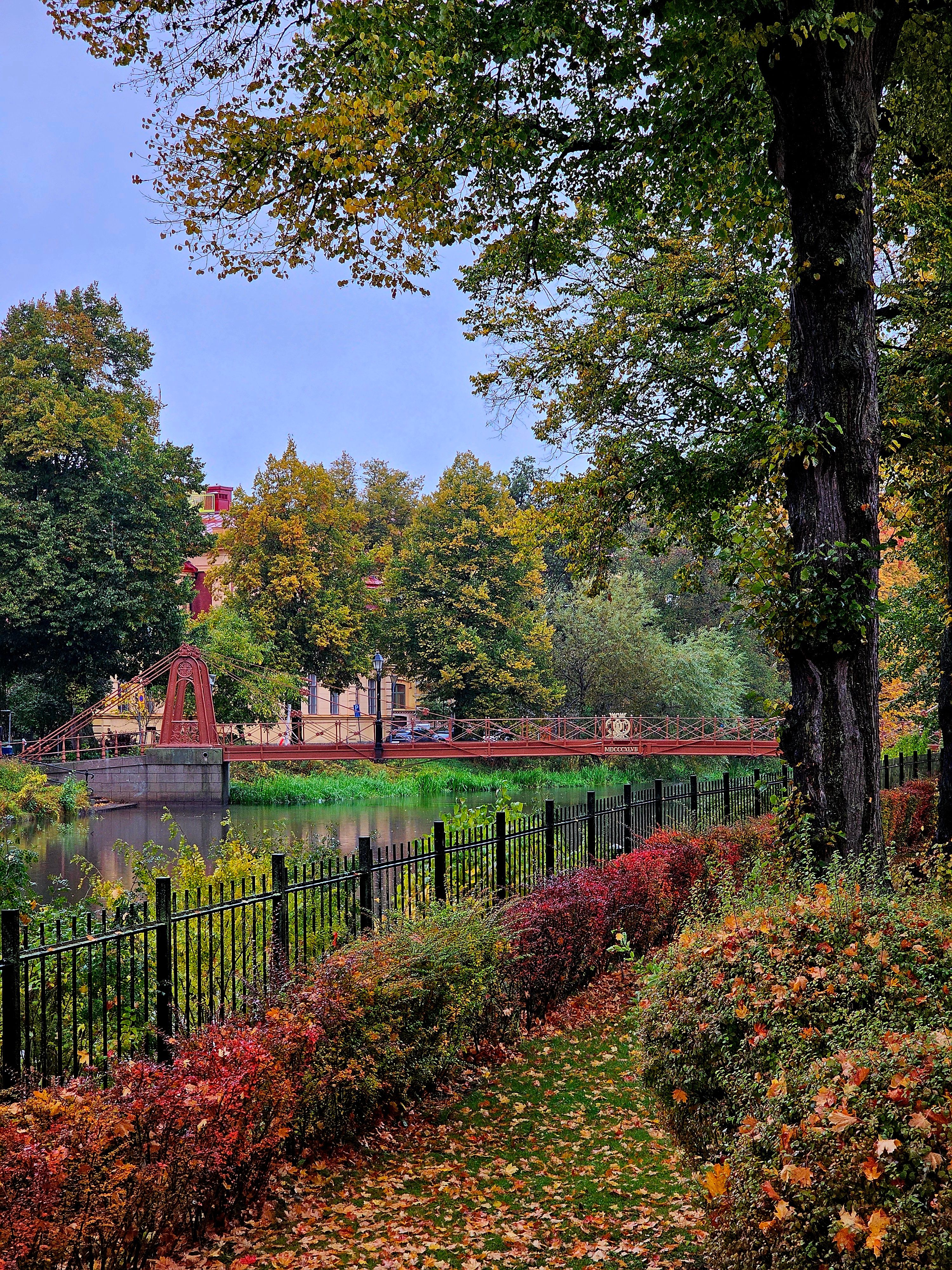Scenic Autumn Pathway in Uppsala Park · Free Stock Photo
