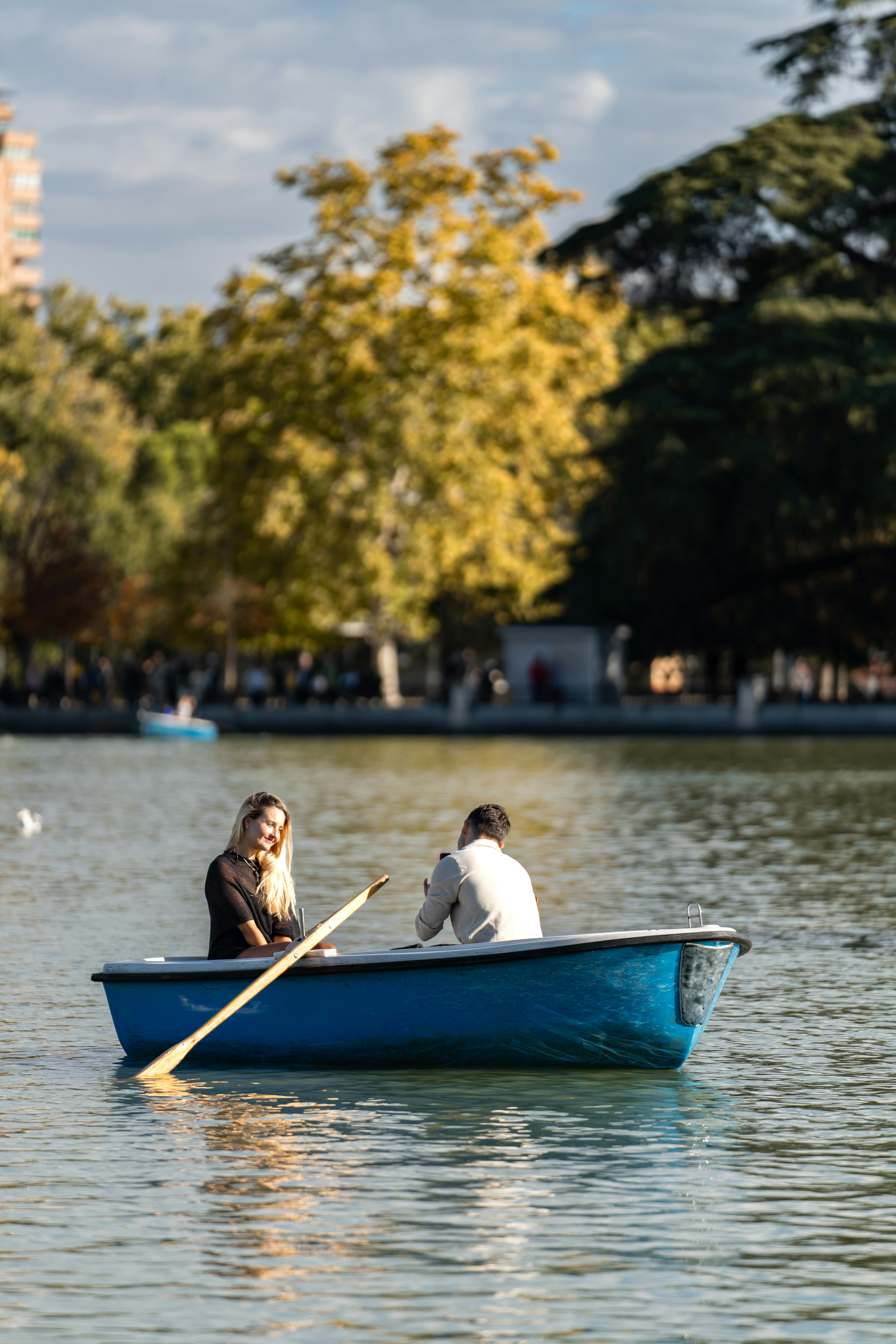 Scenic Boat Ride at Madrid's Retiro Park · Free Stock Photo