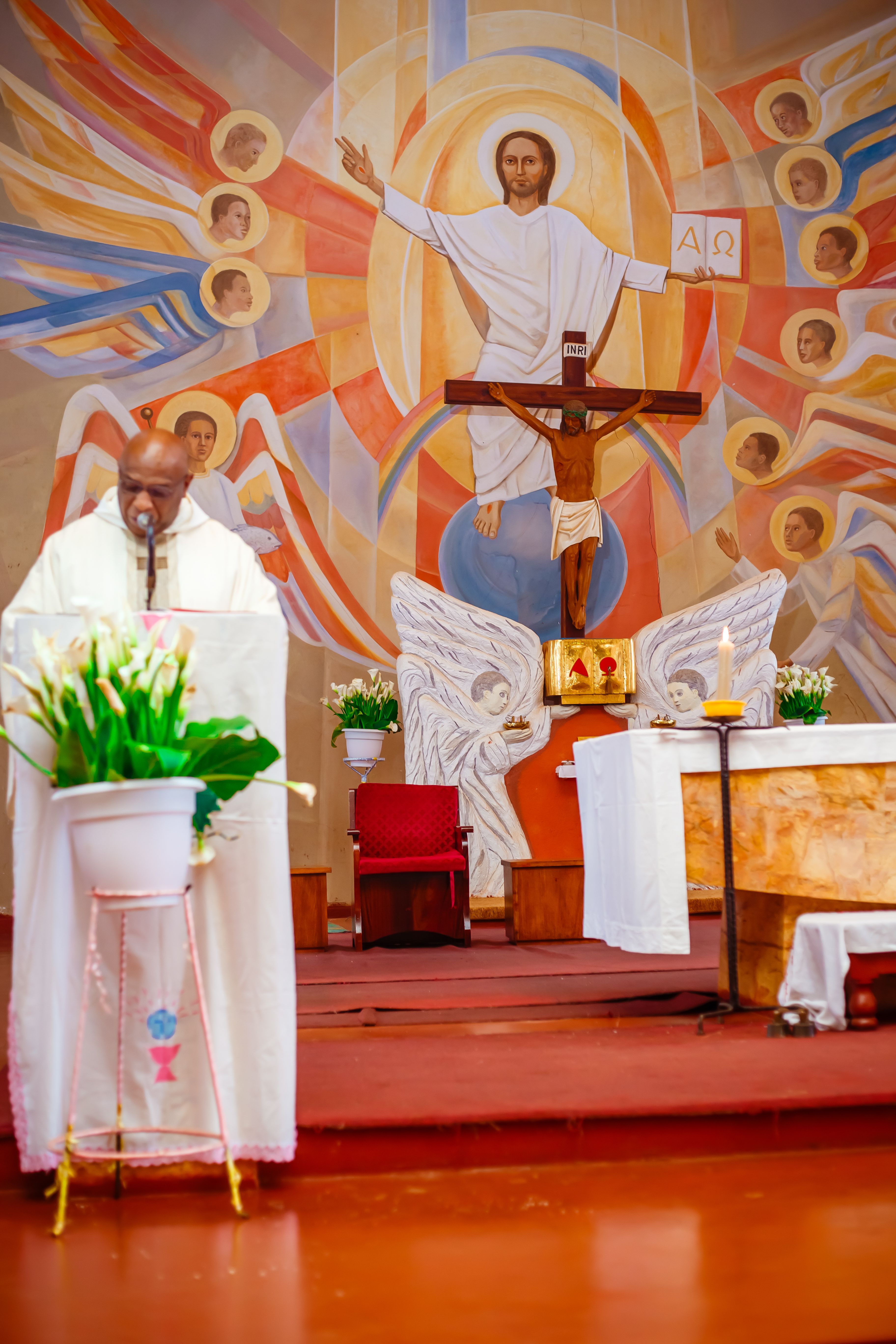 Priest Conducting Mass in Vibrant Church · Free Stock Photo